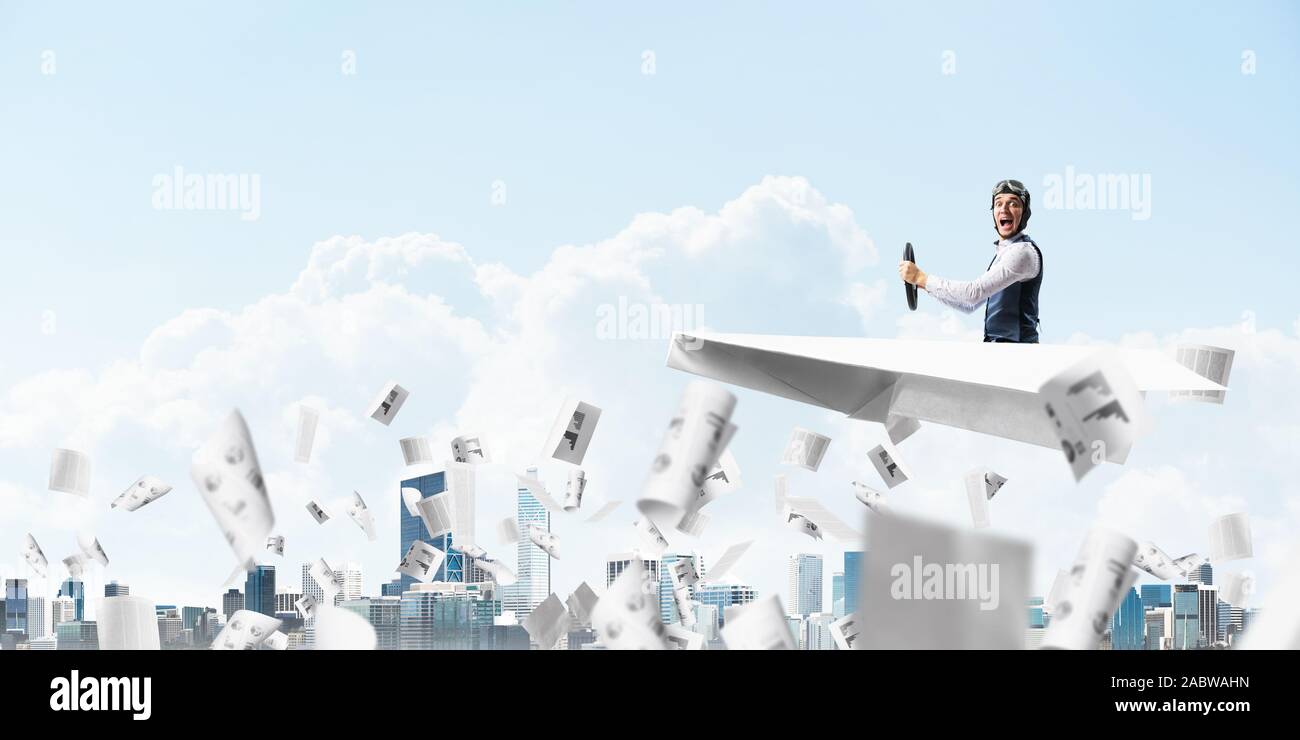 Creative business process concept with funny pilot Stock Photo - Alamy