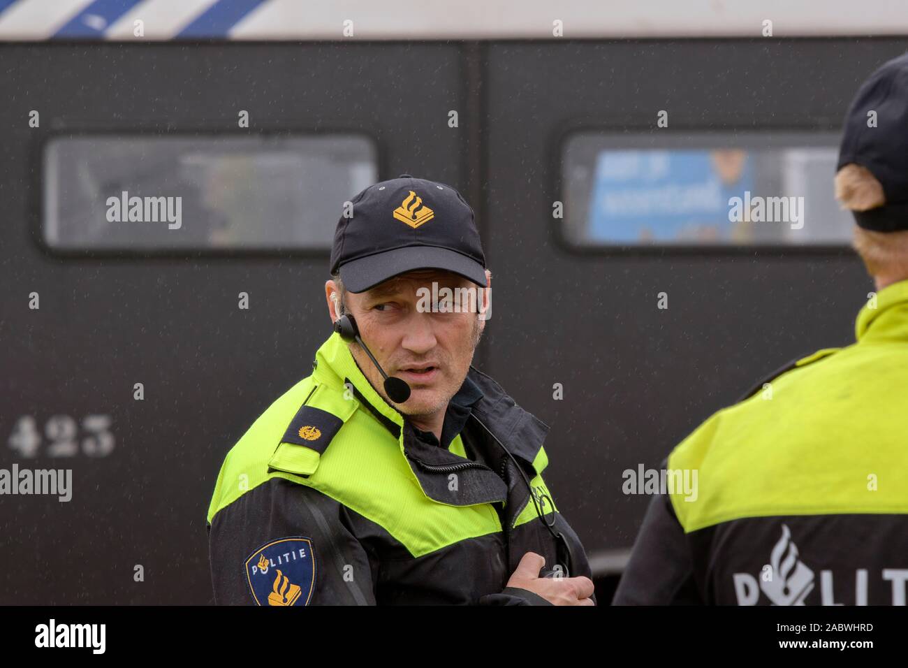 Traffic cop rain hi-res stock photography and images - Alamy