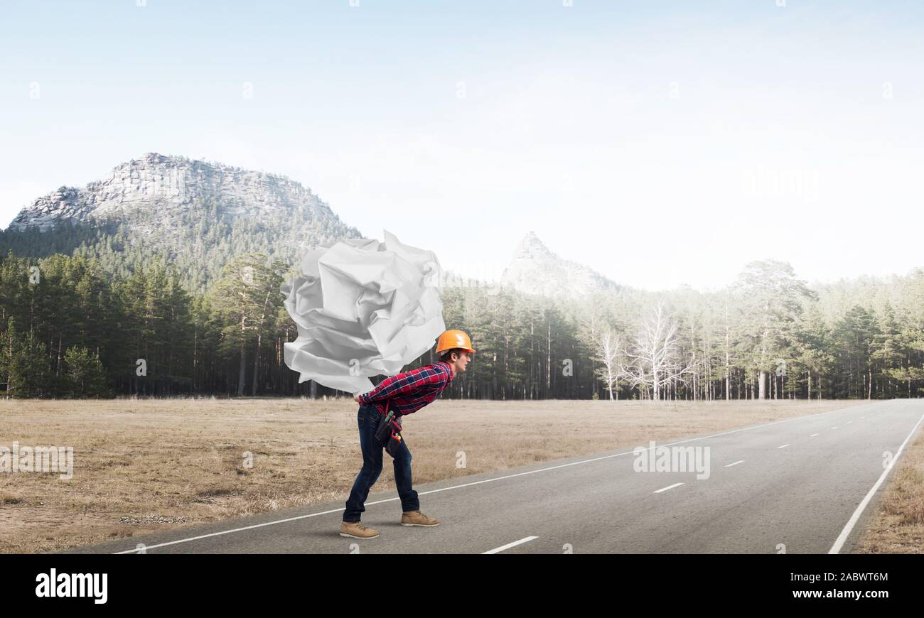 Engineer man carry load Stock Photo - Alamy