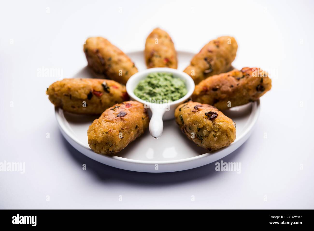 Veg Poha Cutlet or flattened Rice Patties served with tomato ketchup ...