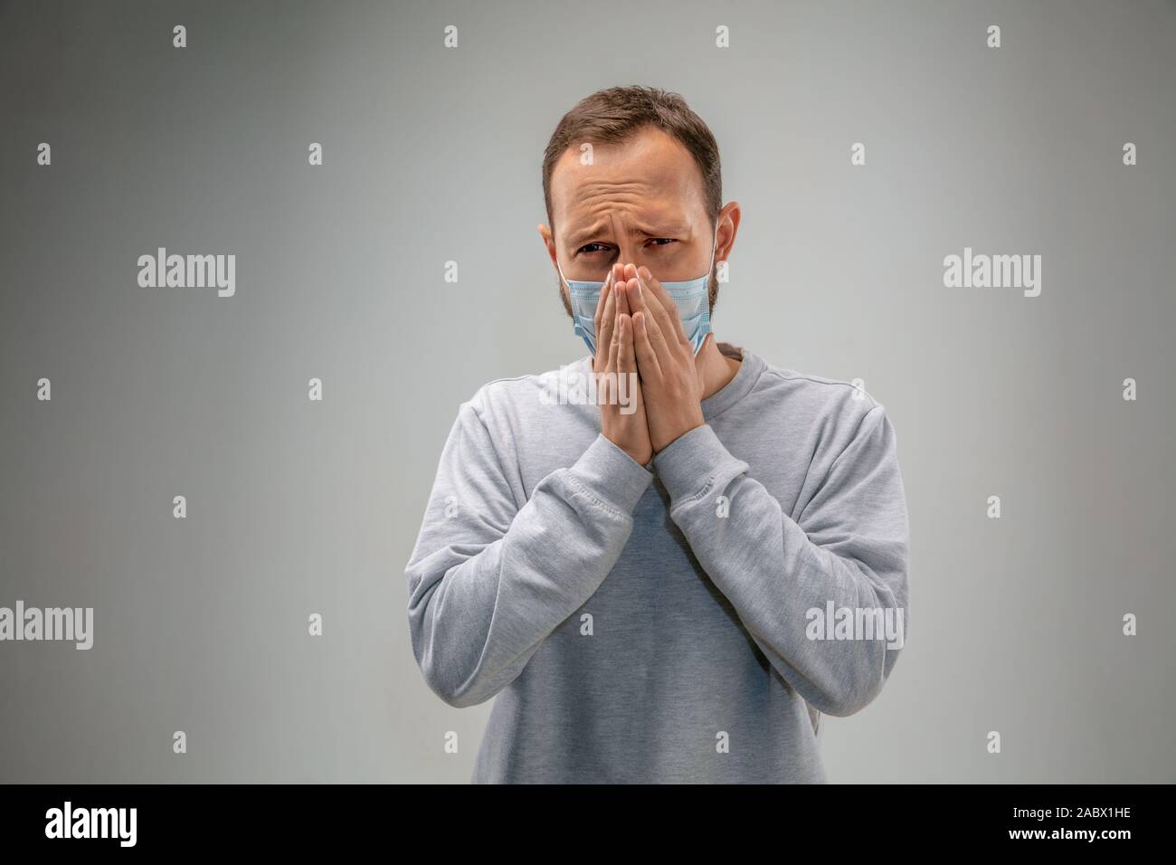 Can't breathe. Caucasian man wearing the respiratory protection mask ...