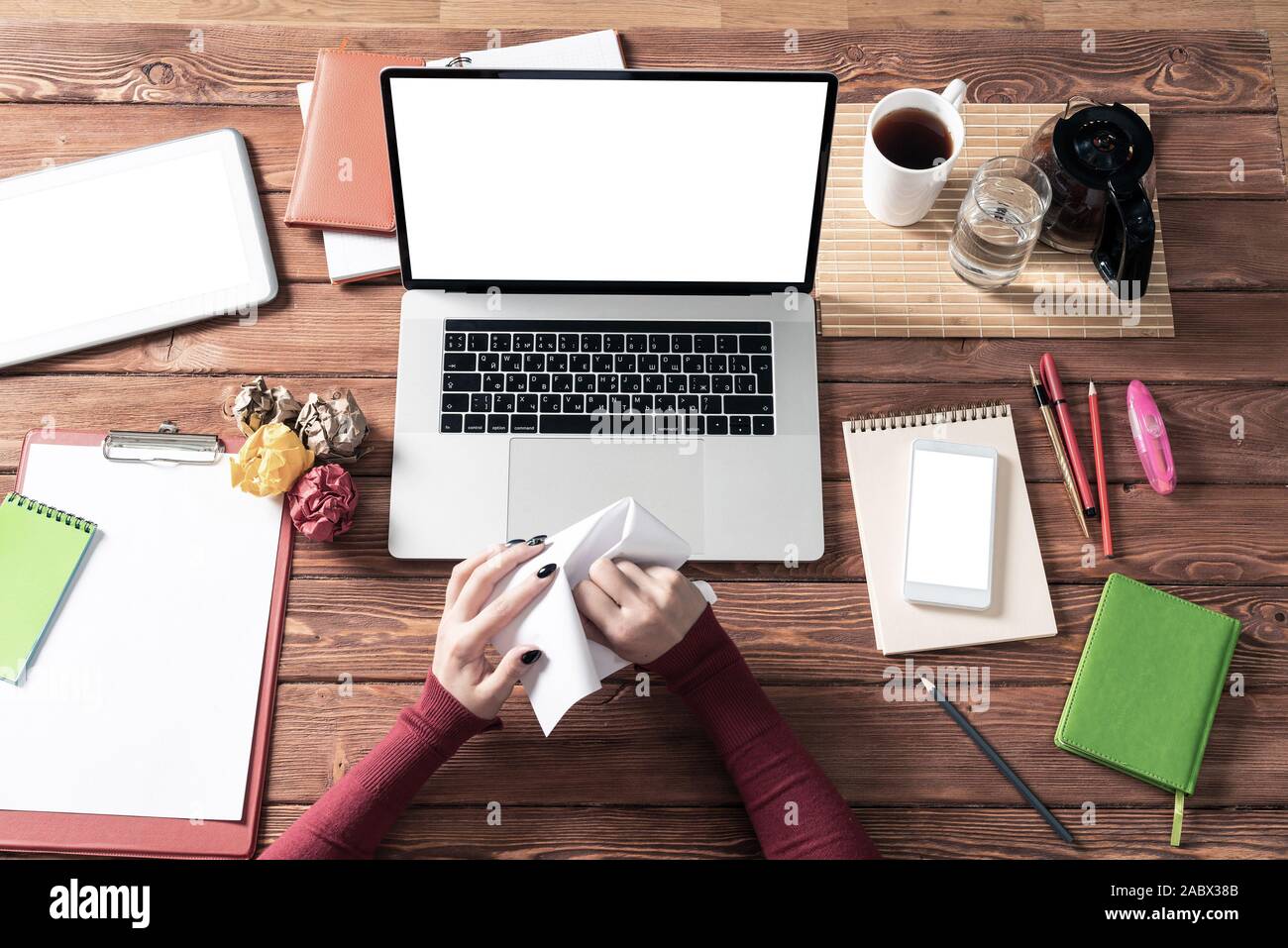 Woman crumpling paper hi-res stock photography and images - Alamy