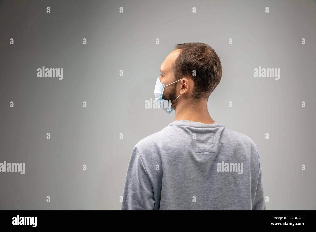 Can't breathe. Caucasian man wearing the respiratory protection mask ...