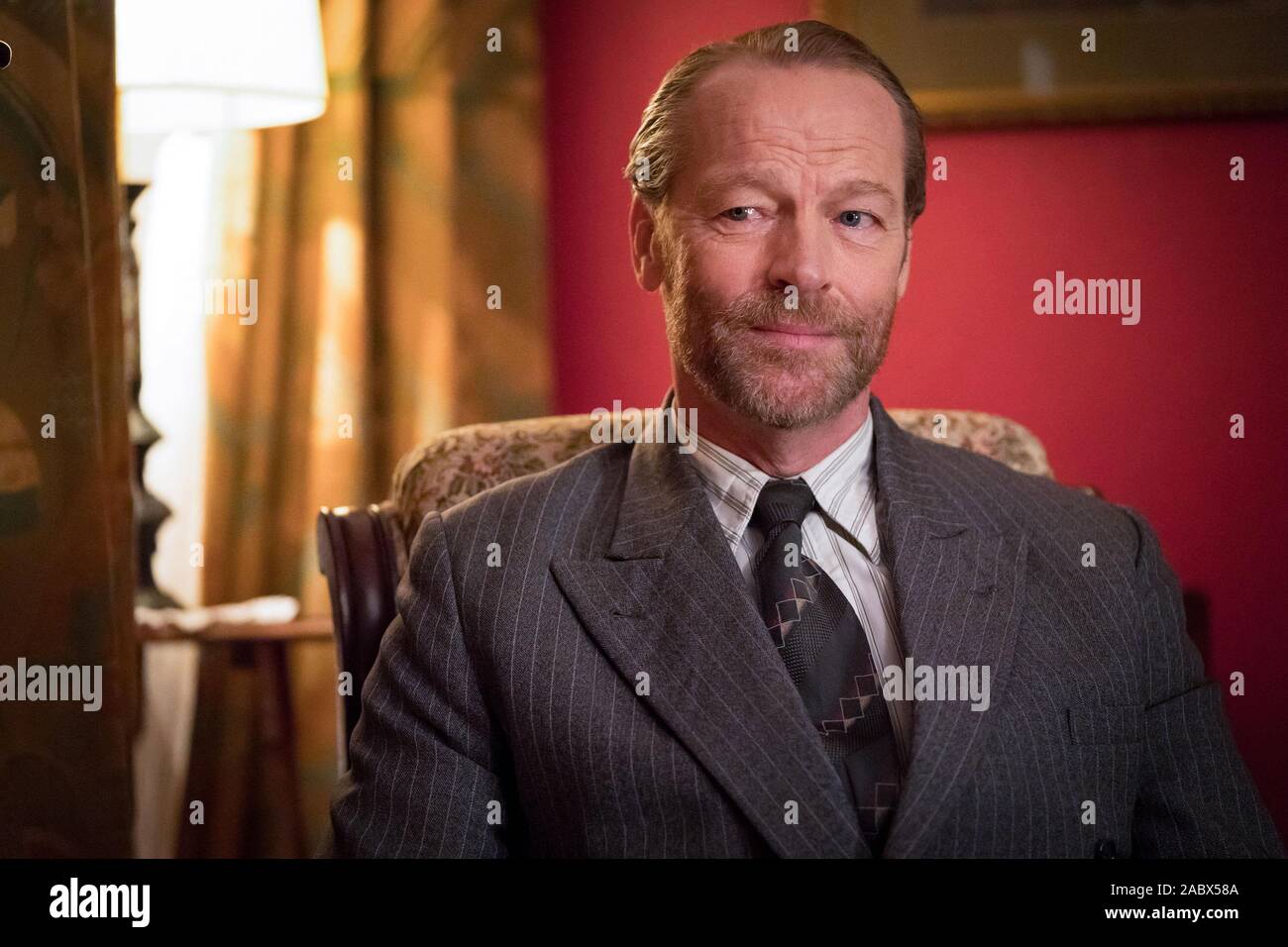 IAIN GLEN in MRS WILSON (2018), directed by RICHARD LAXTON. Credit ...