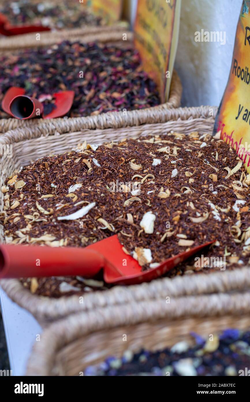 Assortment of herbal aromatic tea blends in tea shop close up Stock ...