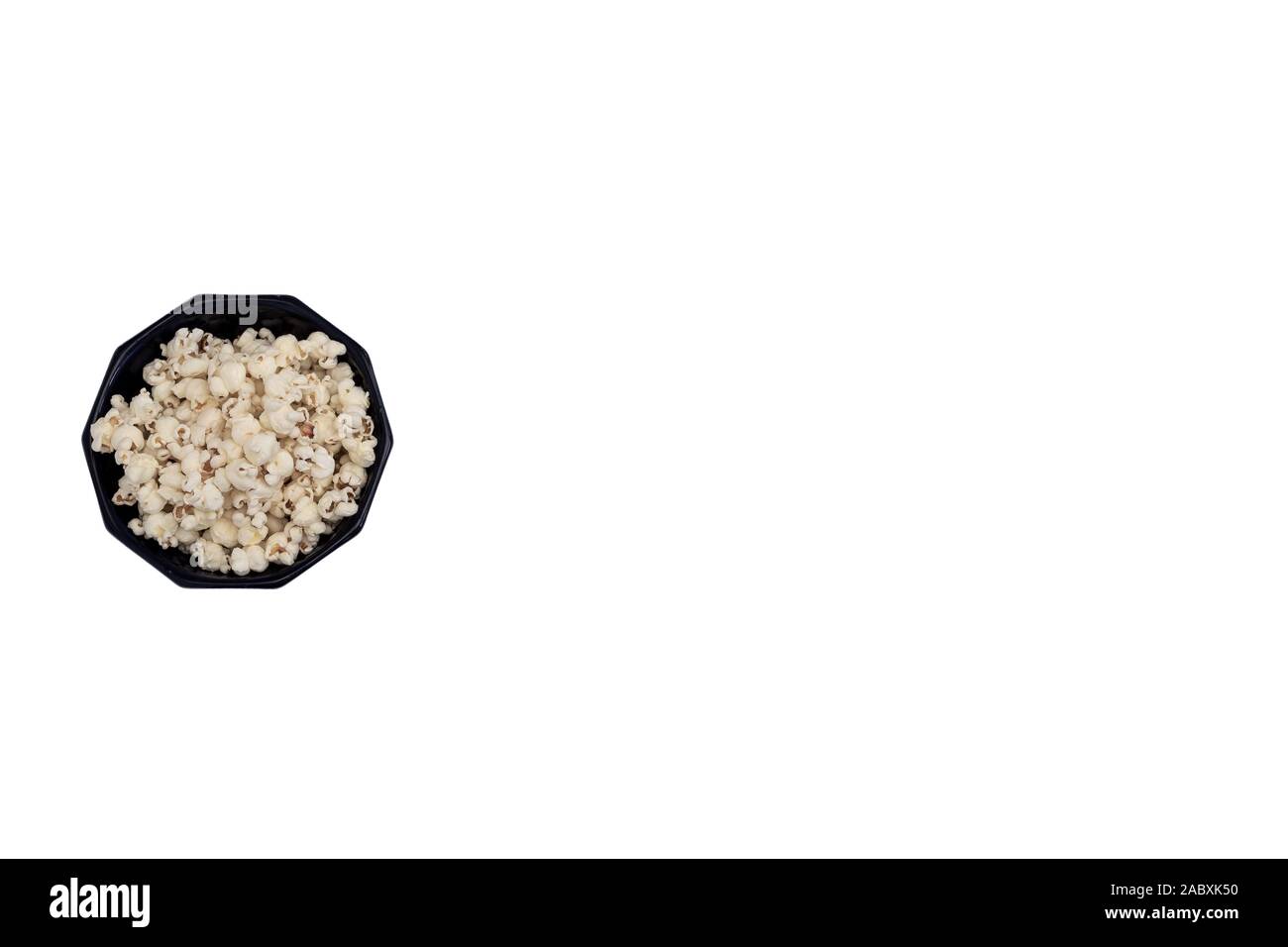 fresh popcorn in bowl top view isolated on white background, space for ...