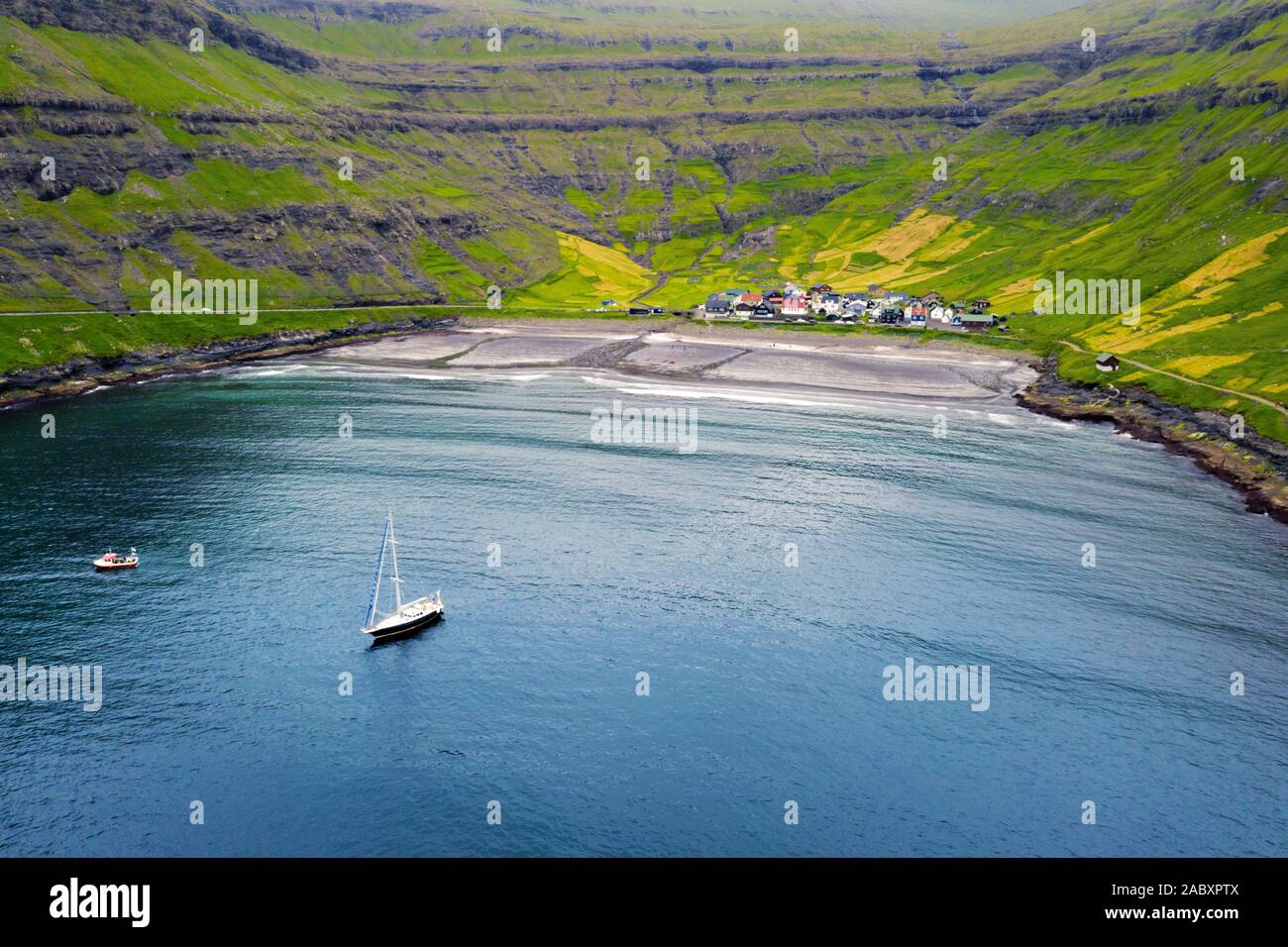 Aerial drone photo flying over Tjornuvik beach on Streymoy island ...