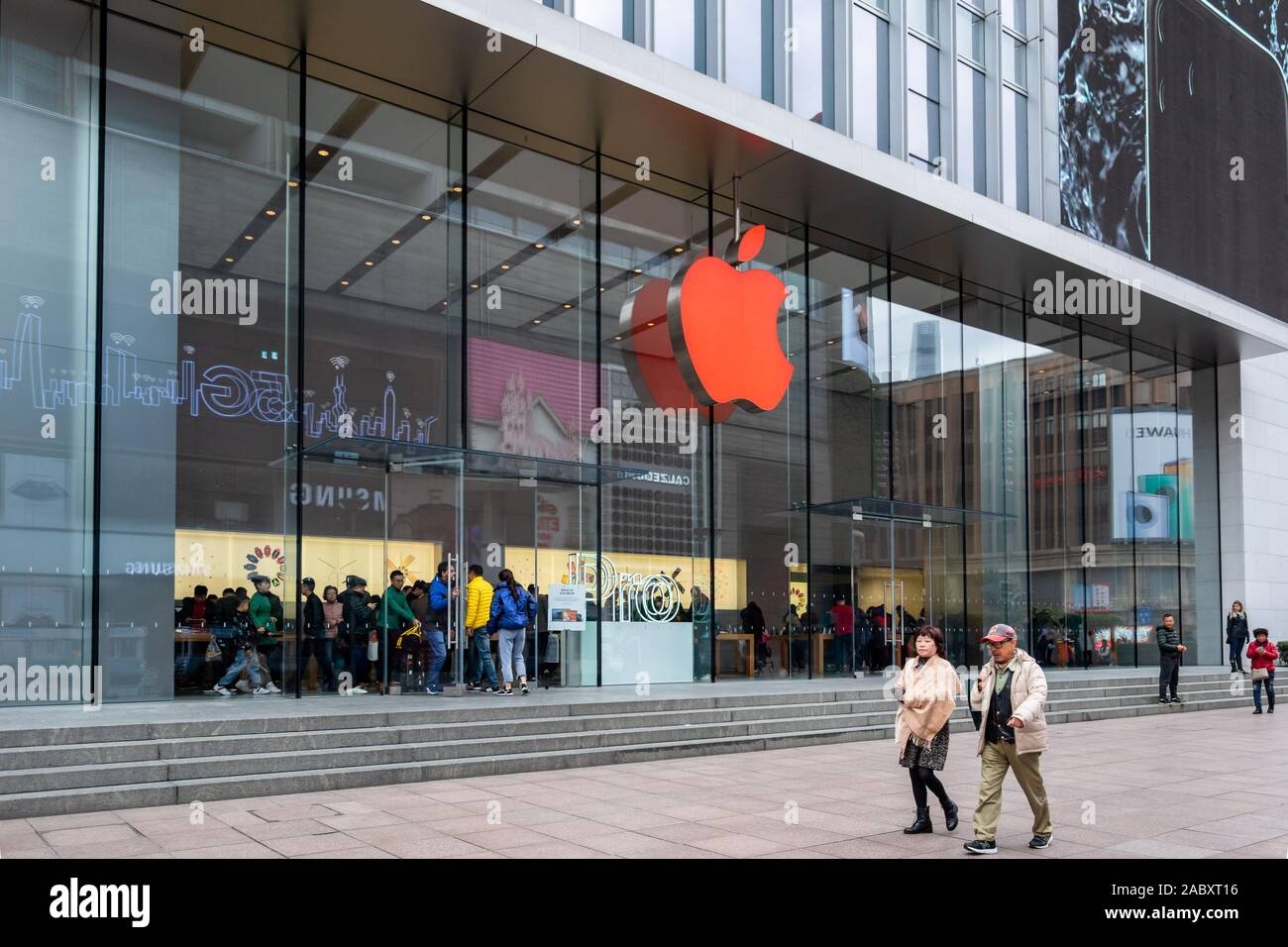 The logo of Apple is lit up in red to mark the upcoming World AIDS Day ...