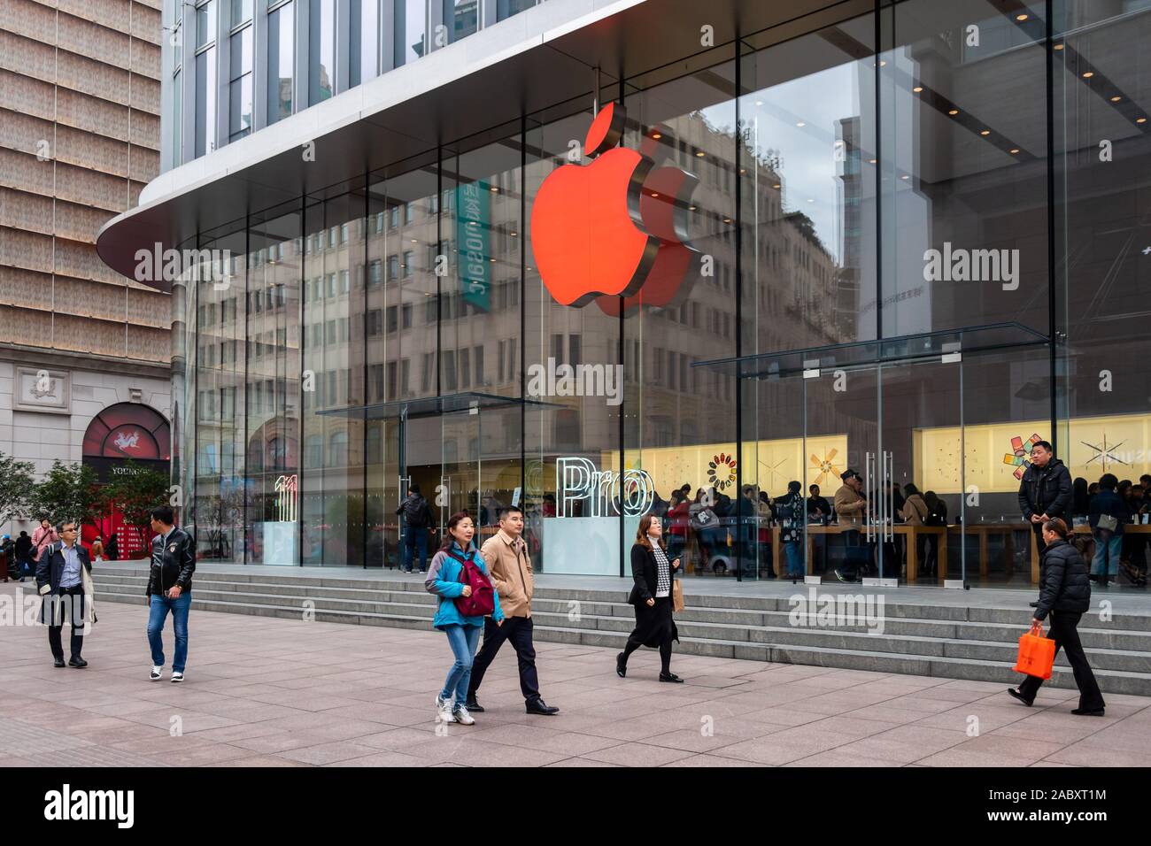 The logo of Apple is lit up in red to mark the upcoming World AIDS Day ...