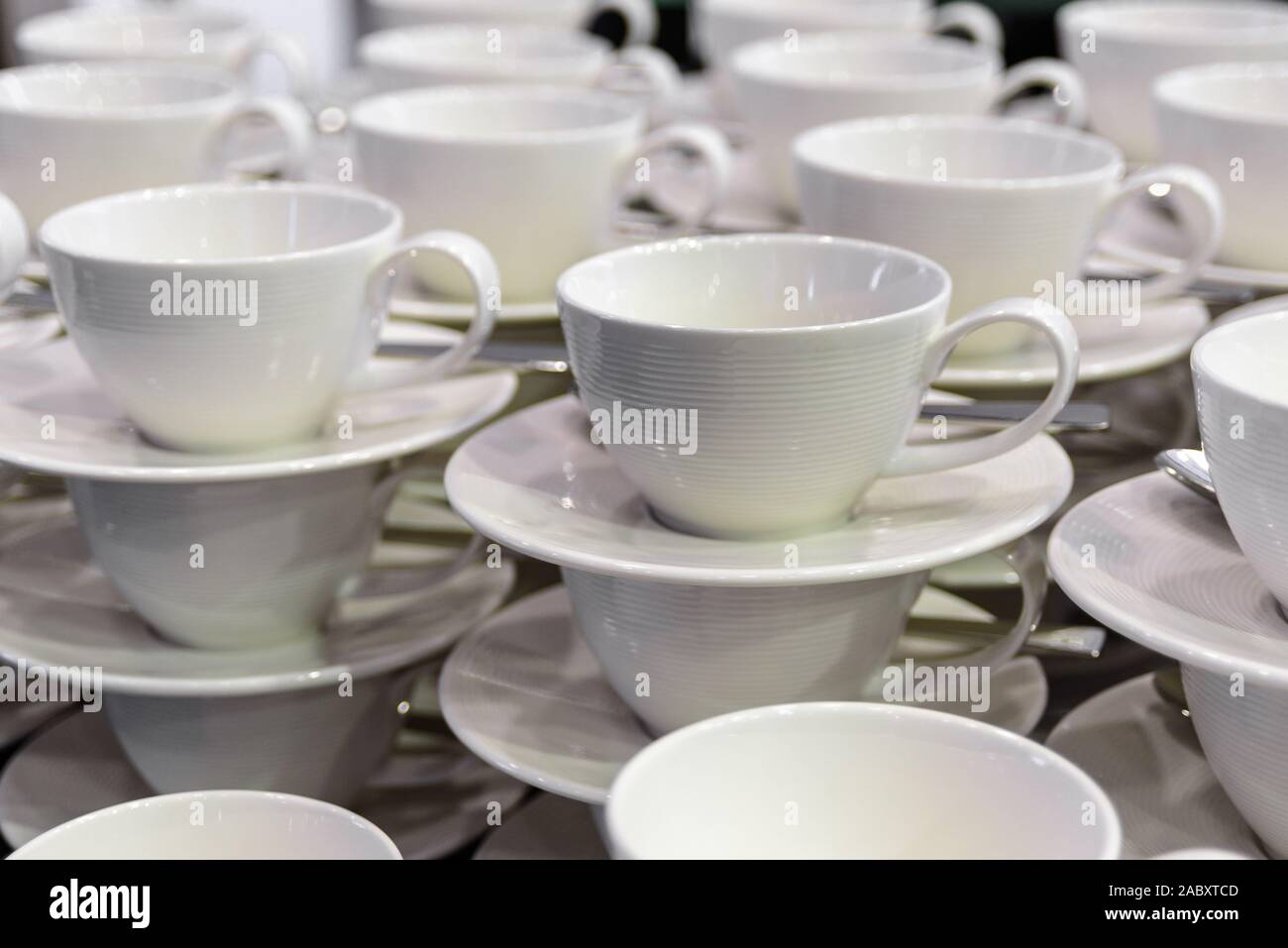 Many empty cups for coffee in restaurant or hotel Stock Photo - Alamy