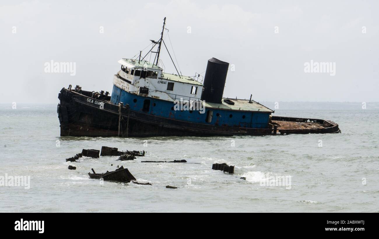 Abandoned ships rust away along the coast of Angola Stock Photo - Alamy