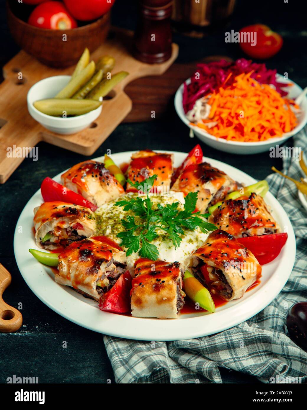turkish beyti kebab served with yogurt, pepper and tomato Stock Photo ...