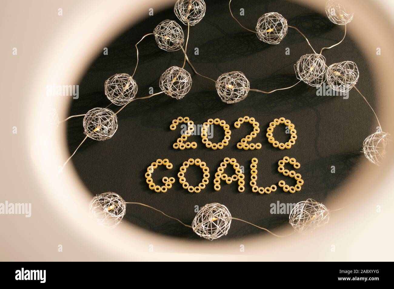Goals for 2020 new year. Conceptual image. Metallic spherical lights on ...