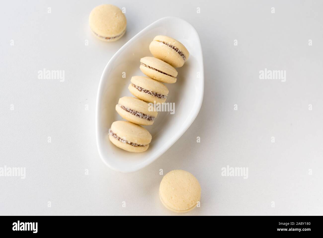 Top view of Alfajores,shortbread cookies filled with caramel and rolled ...