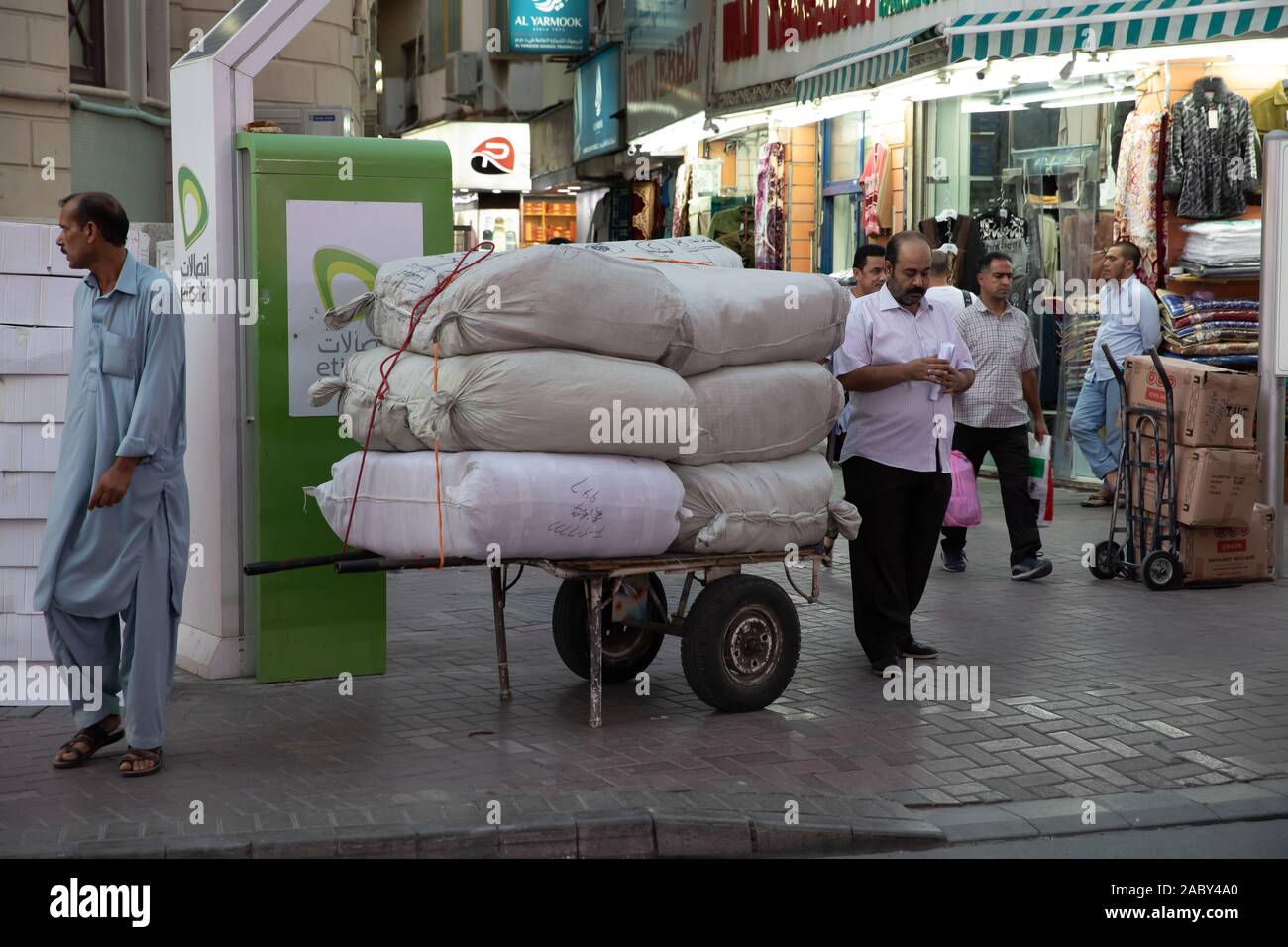 Market traders in Dubai, UAE Stock Photo - Alamy