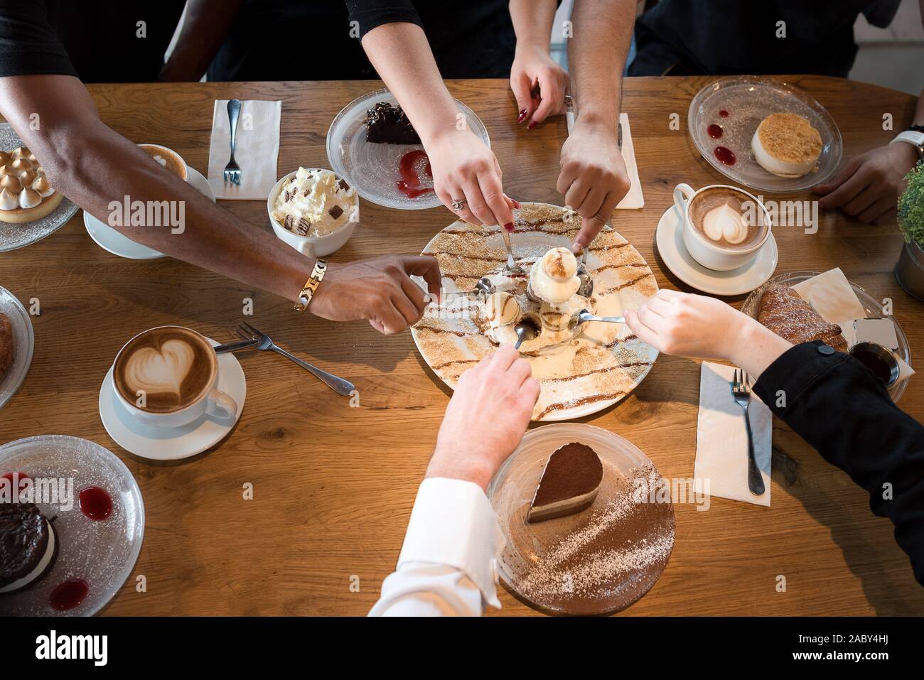 People Sitting Around Tables High Resolution Stock Photography and ...