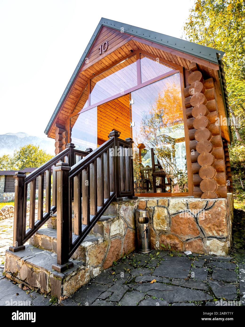 wooden restaurant cottage in the garden Stock Photo - Alamy