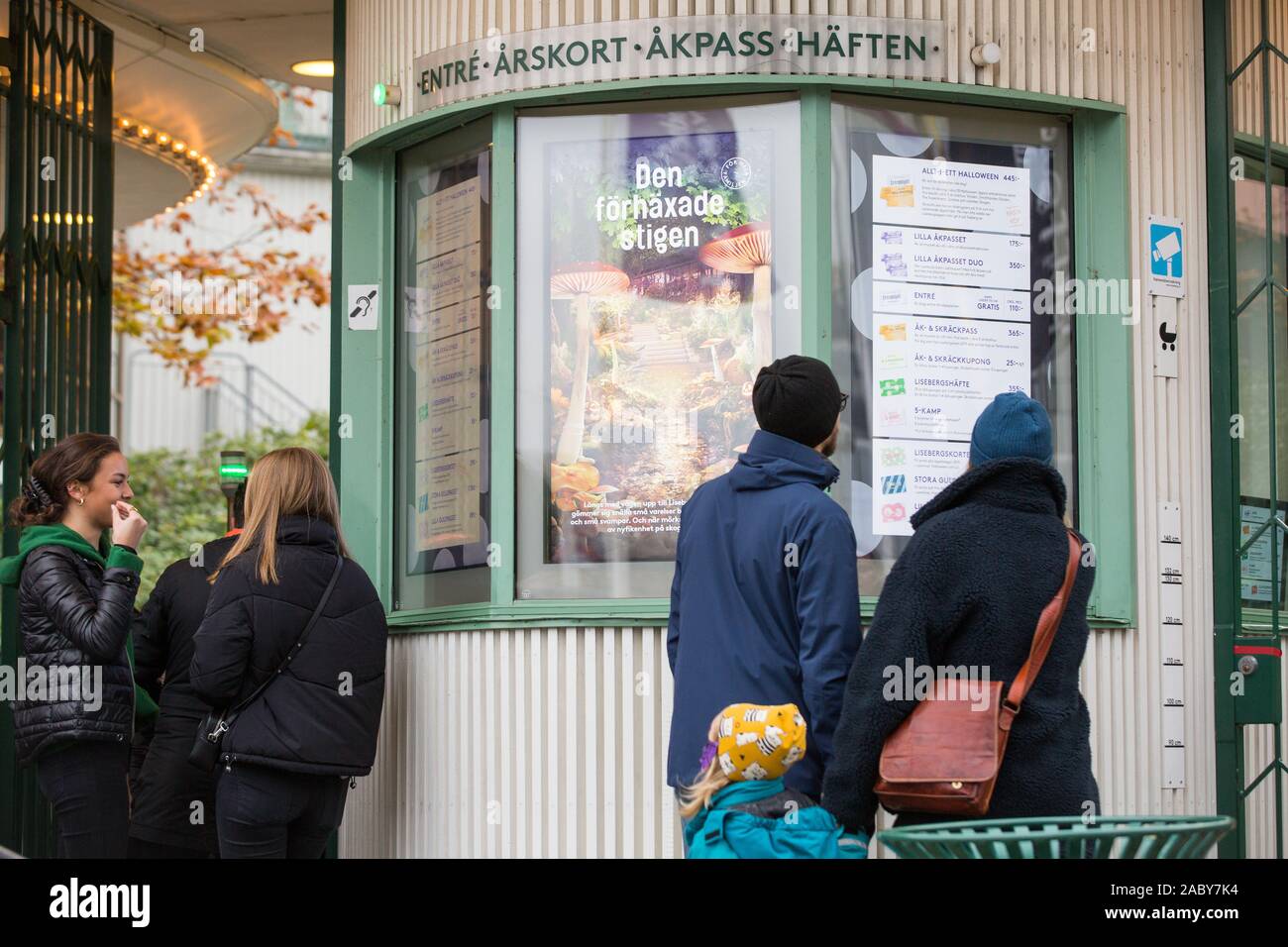 People stand in queues at the ticket office of the Scandinavia's ...