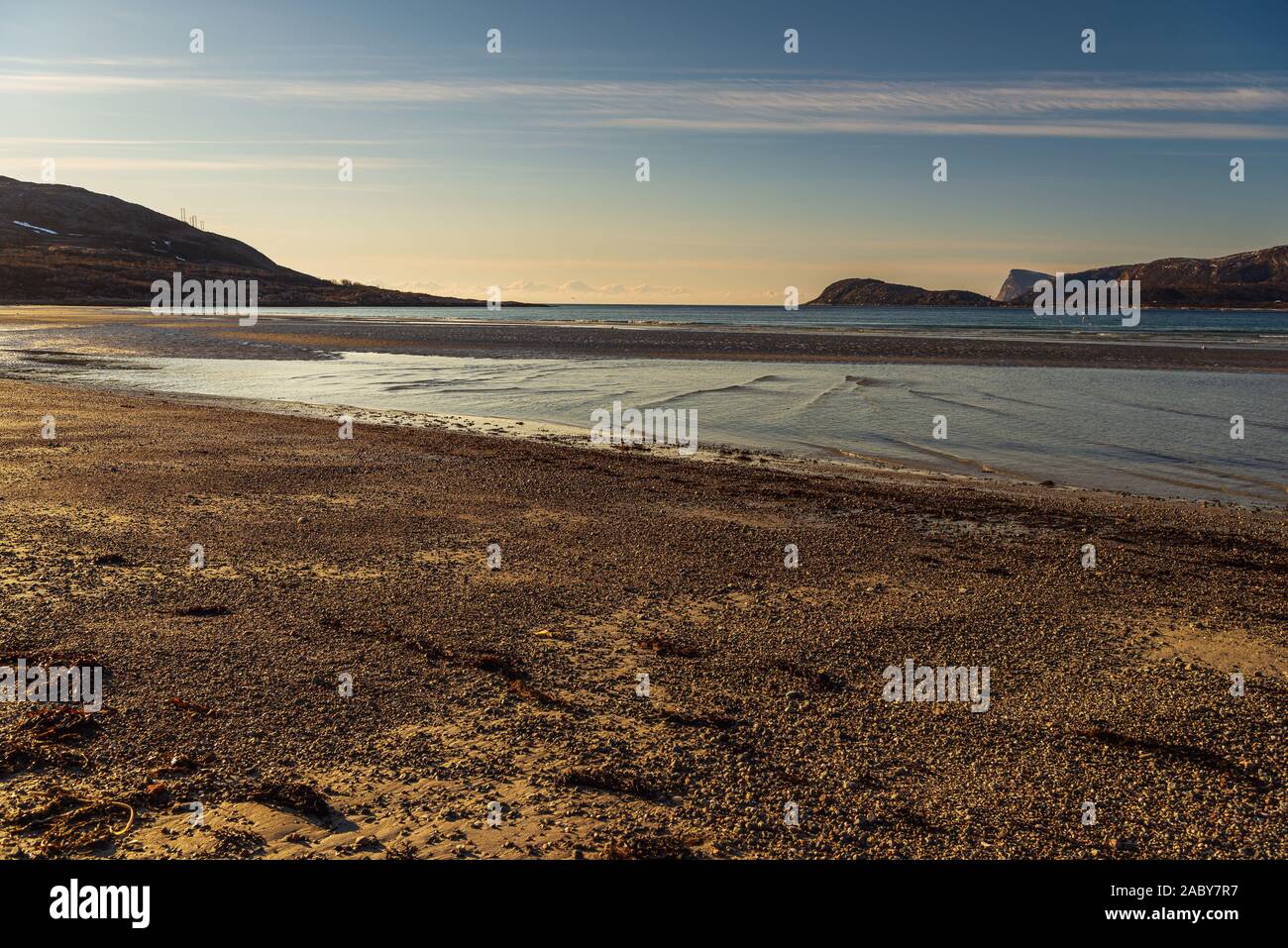 sunset over sandvika beach in Tromso region during a spring afternoon ...