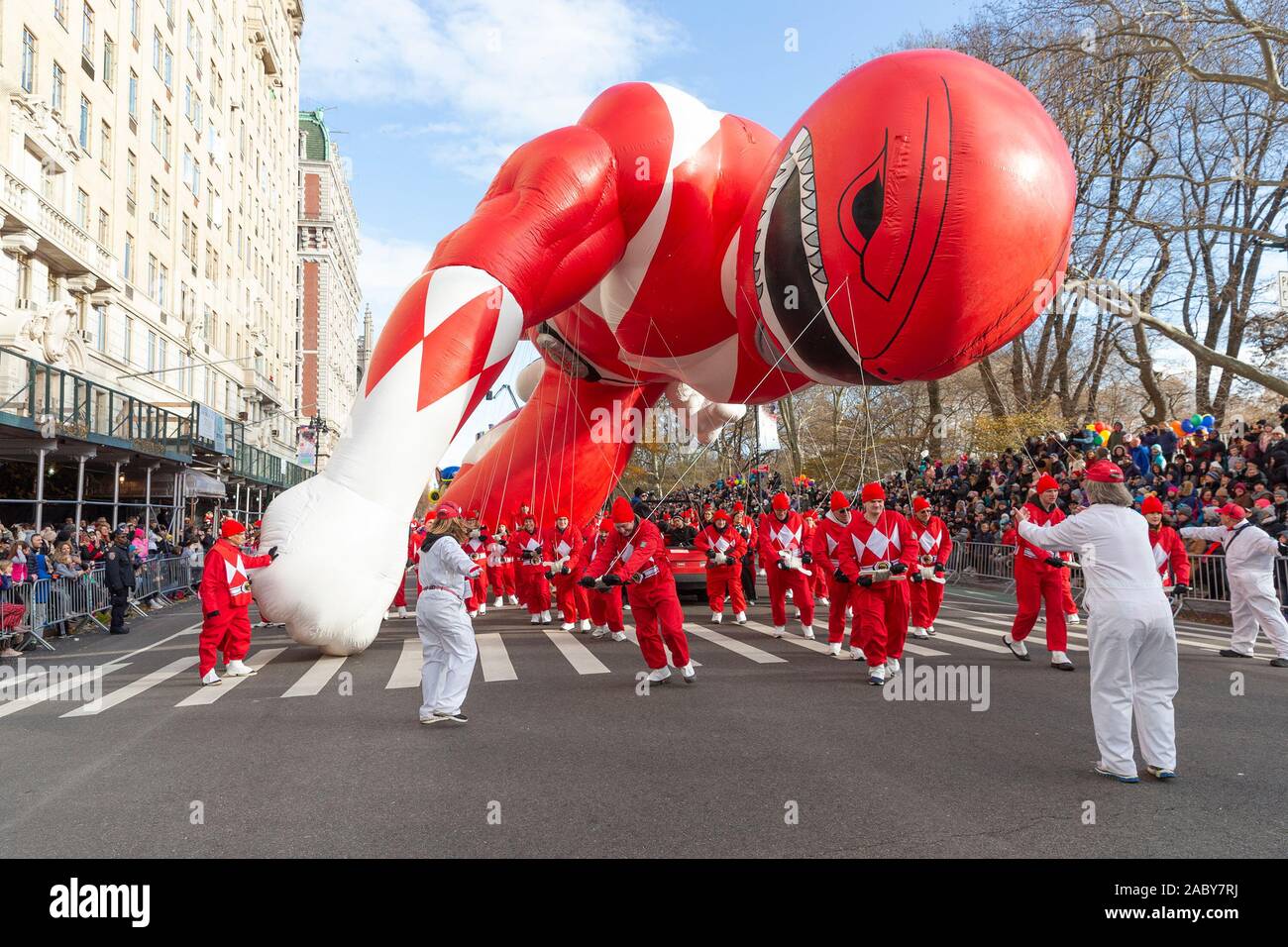 Handlers struggle to keep Power Rangers Mighty Morphin Red Ranger giant ...