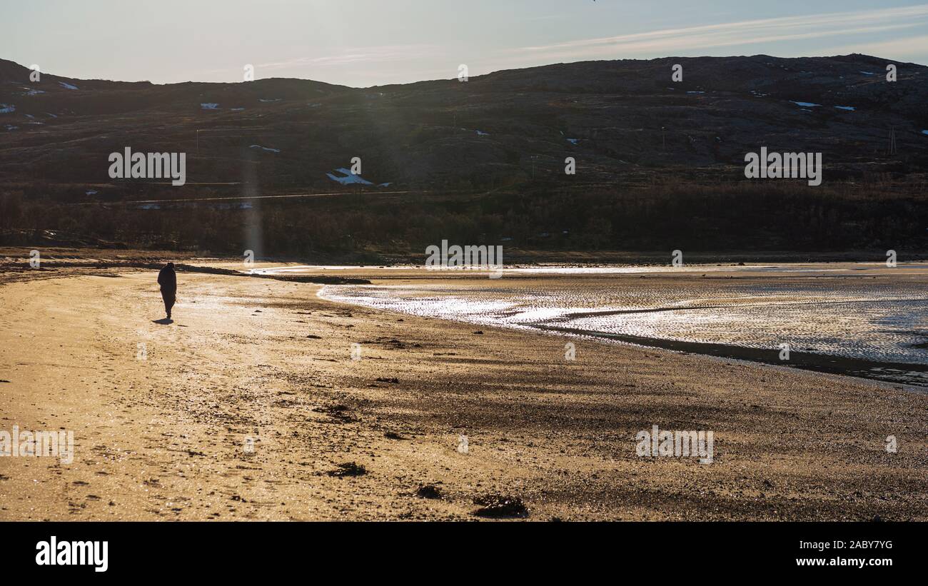 sunset over sandvika beach in Tromso region during a spring afternoon ...