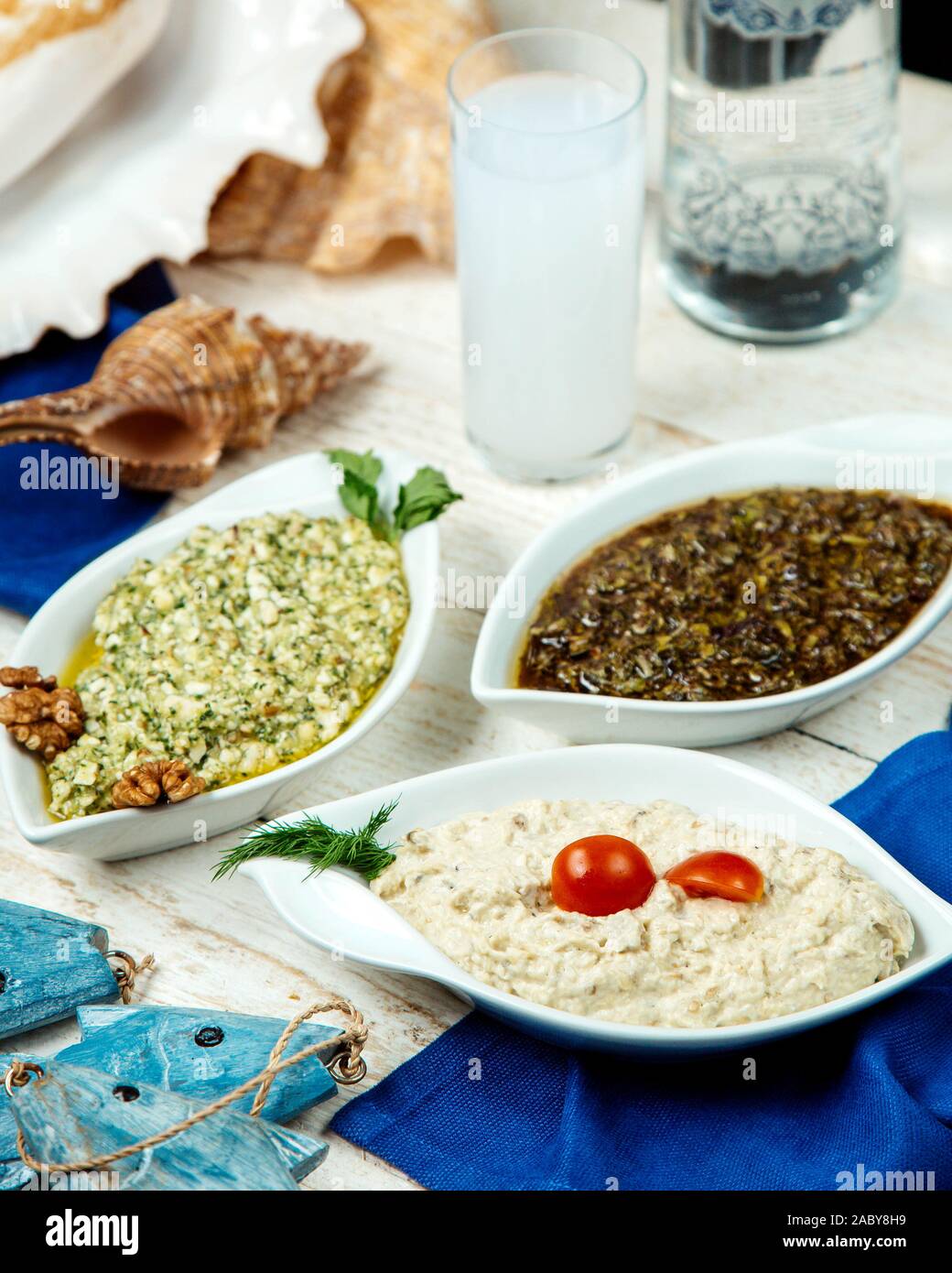 turkish side dishes platter and turkish raki Stock Photo - Alamy