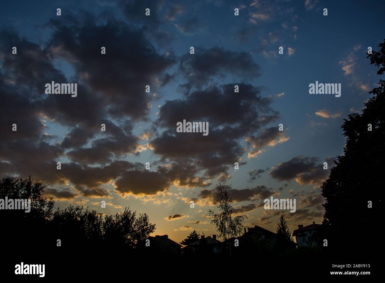 Beautiful blue hour, the sunset sky with colorful clouds, low light ...