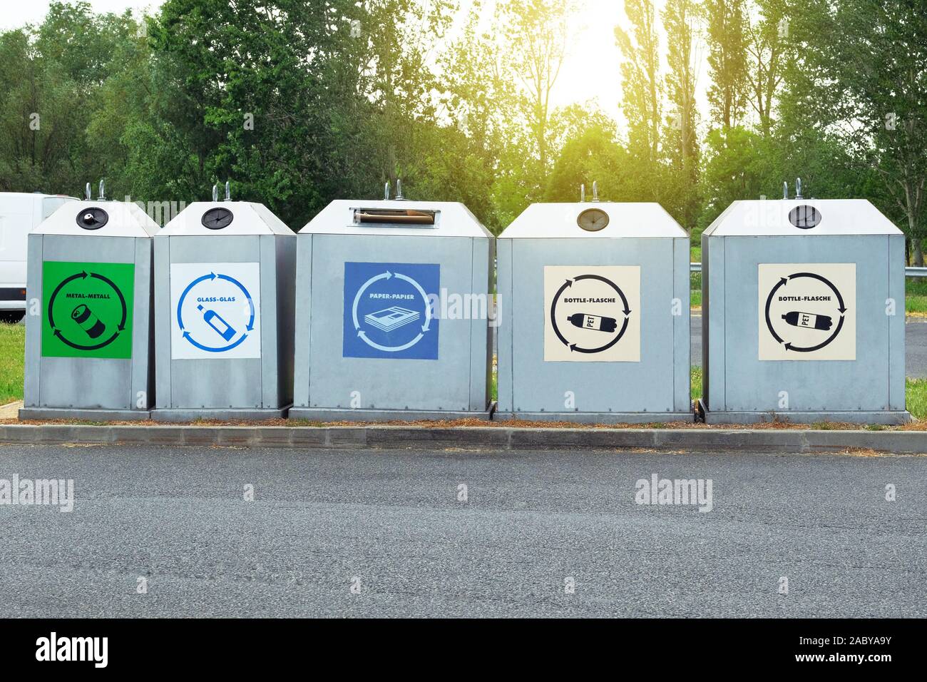 Waste recycling concept. Containers for plastic, metal, glass, paper ...