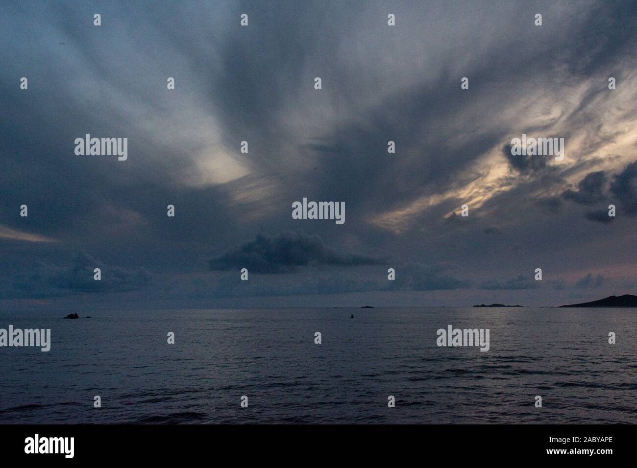 An atmospheric sky at dusk in the Isles of Scilly Stock Photo - Alamy