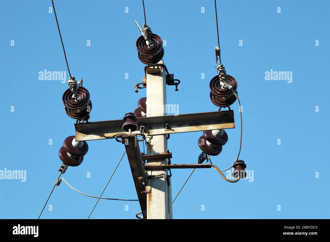 Electric wires on a ferro-concrete column Stock Photo - Alamy