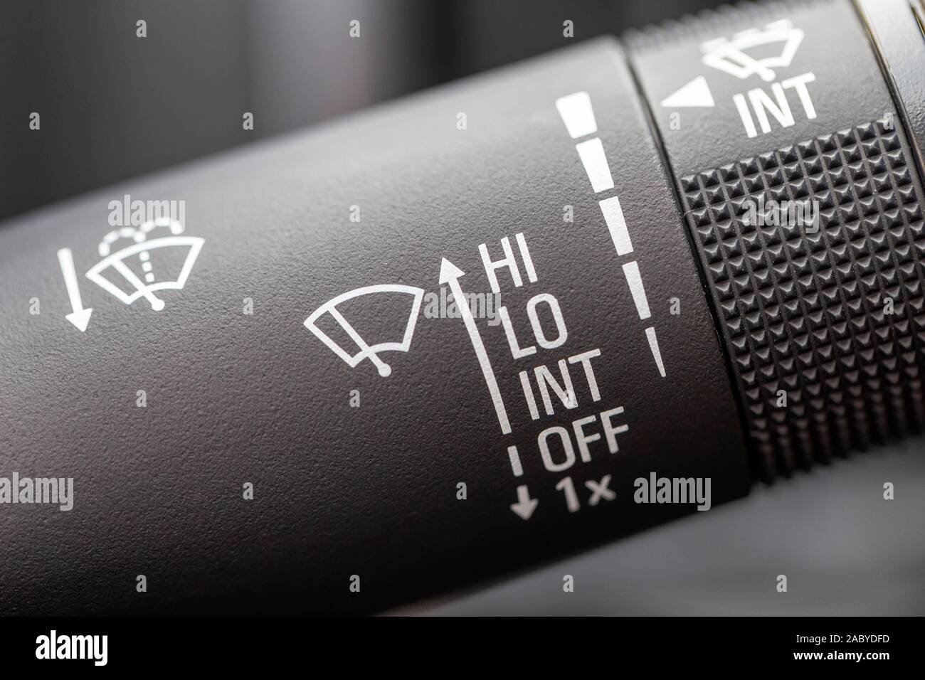 Detail of steering wheel wipers and washers control buttons in modern ...