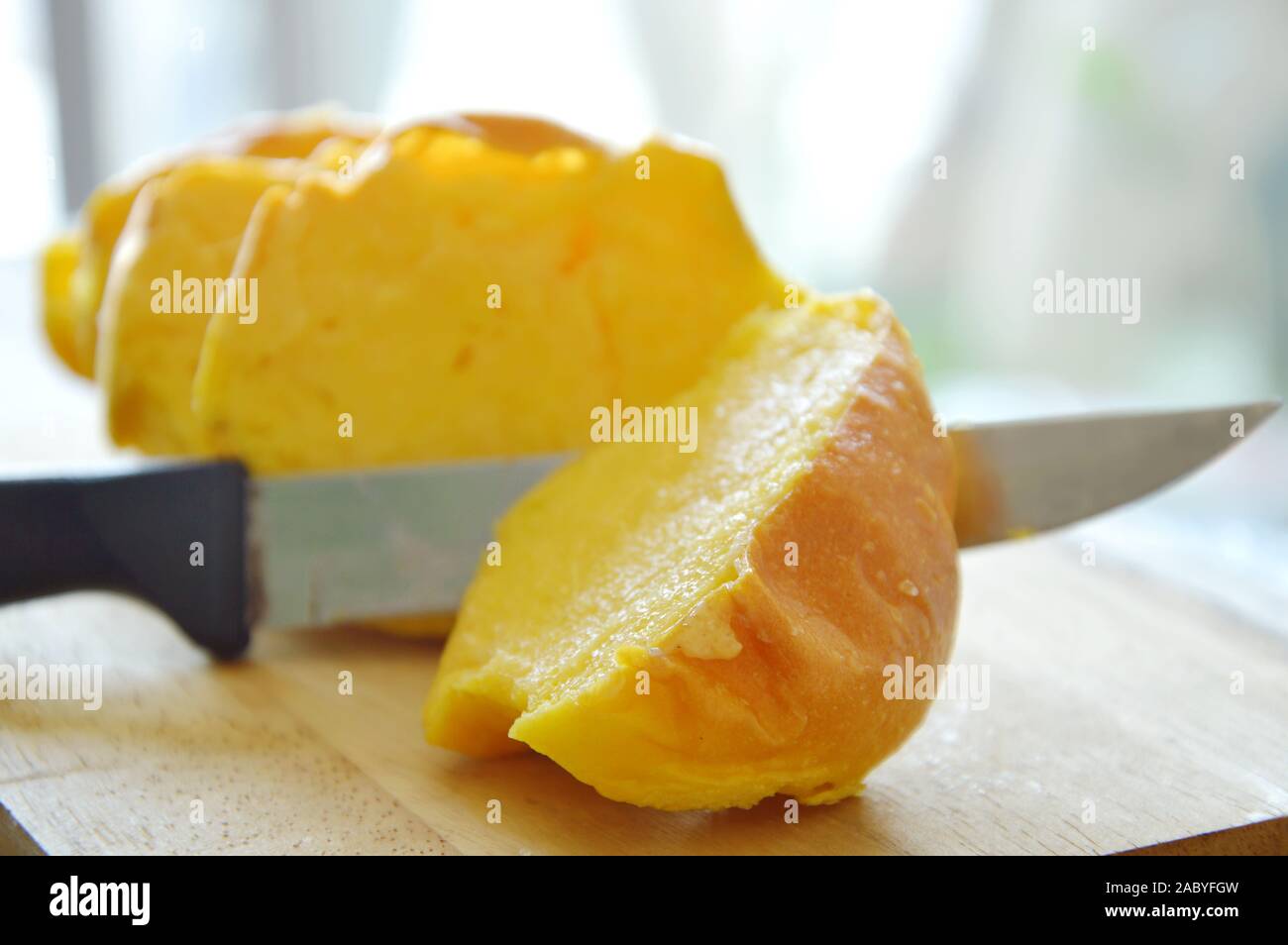 bread dressing butter and sugar slice on wooden chop block Stock Photo ...