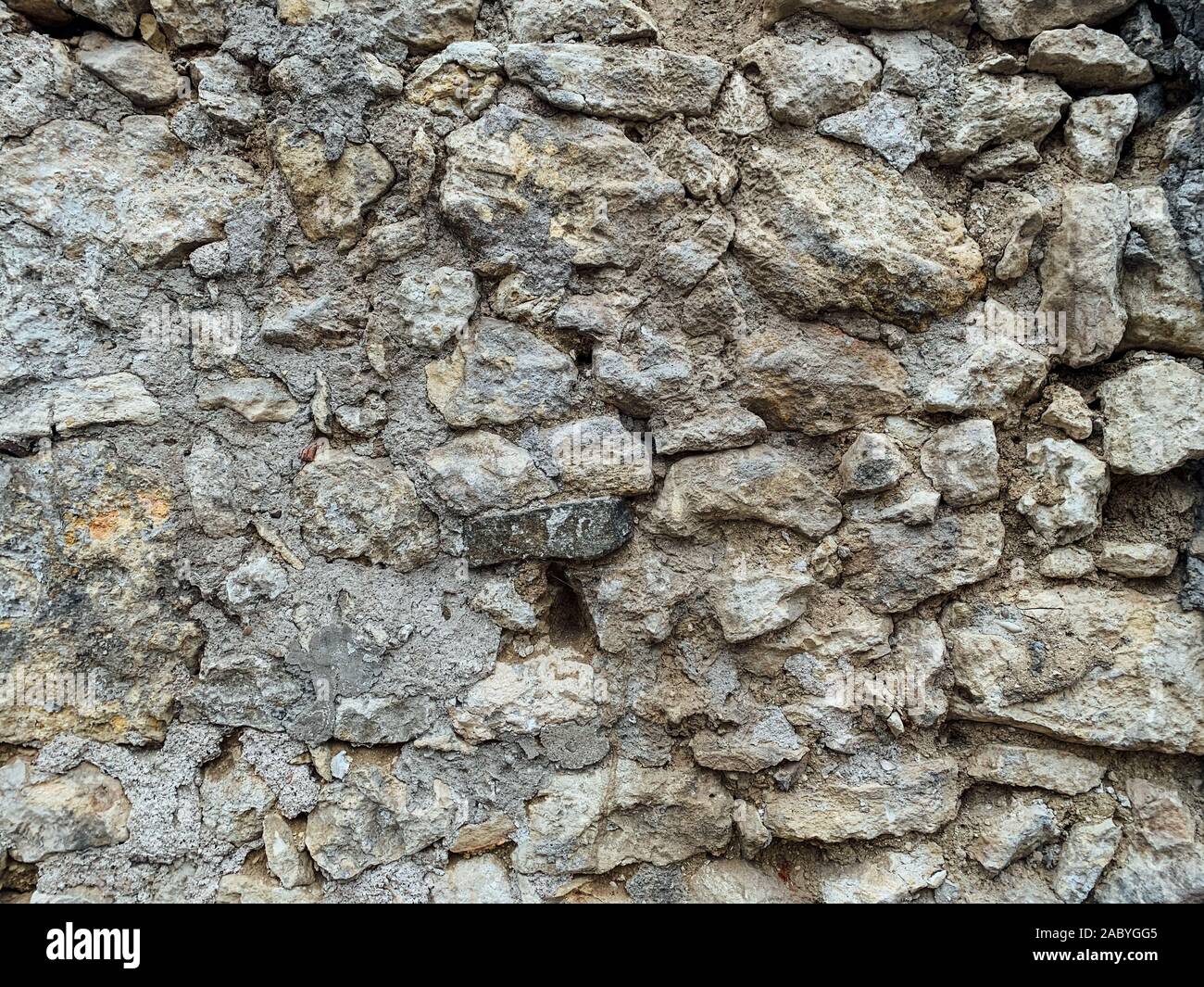 old vintage stone wall structure as background Stock Photo - Alamy