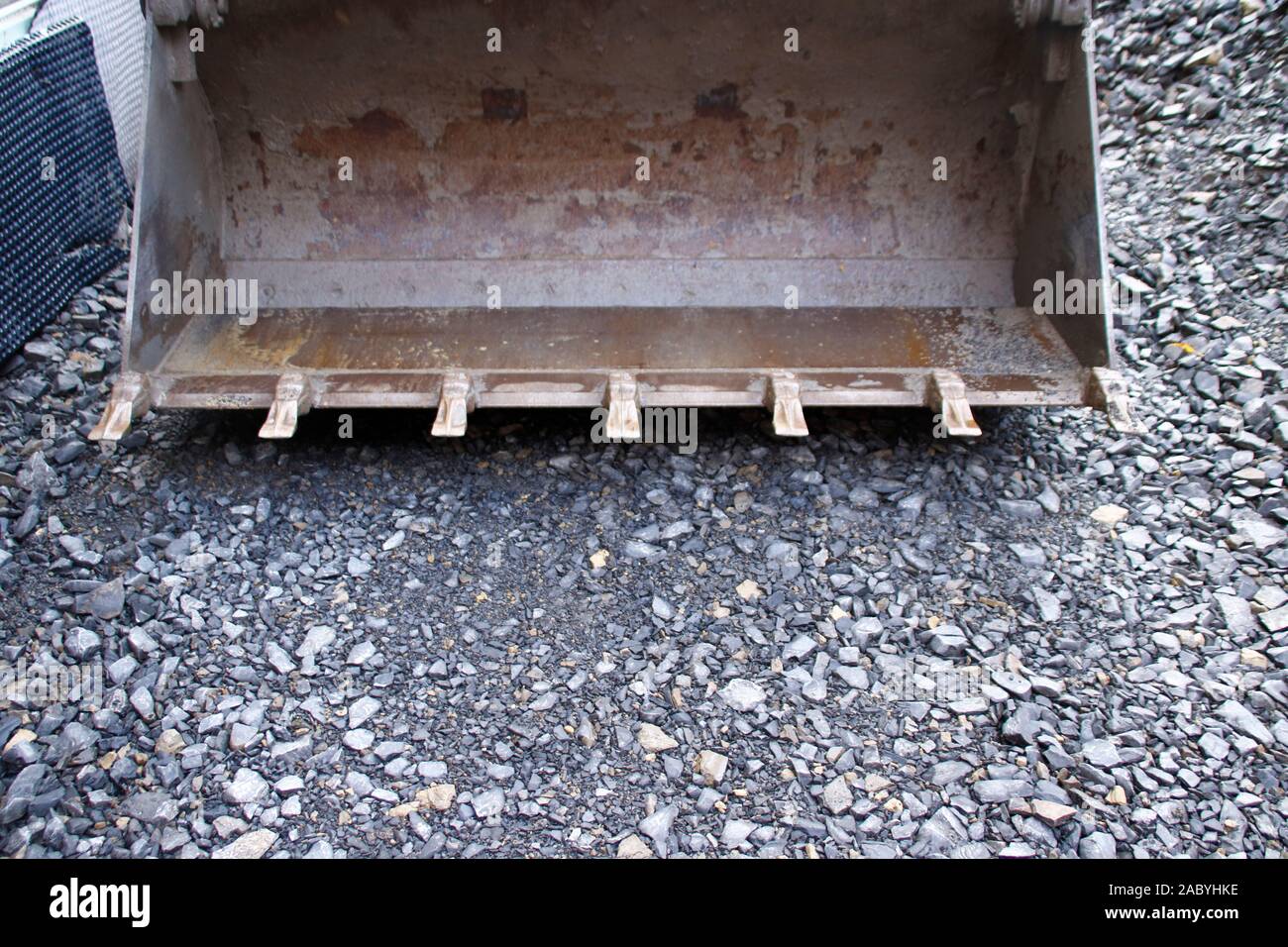 Teeth on a bucket on a wheel loader Stock Photo - Alamy