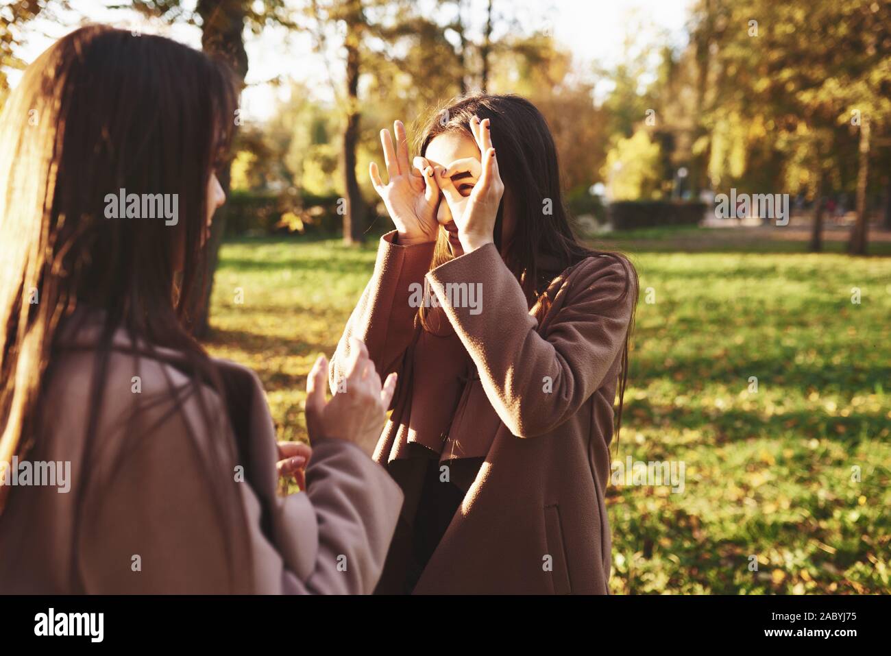 Fingers around eyes hi-res stock photography and images - Alamy