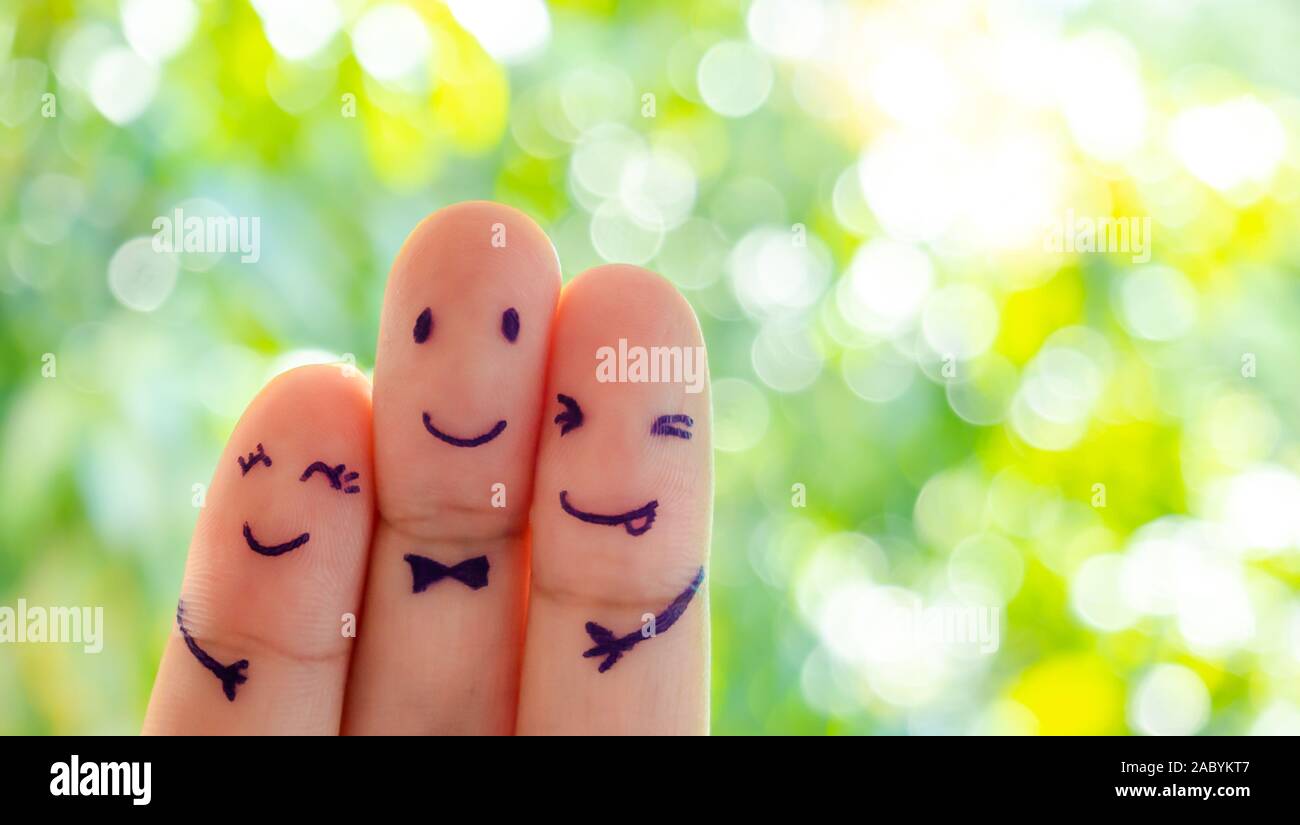 Happy family finger of loving father and mother with son with smiley ...