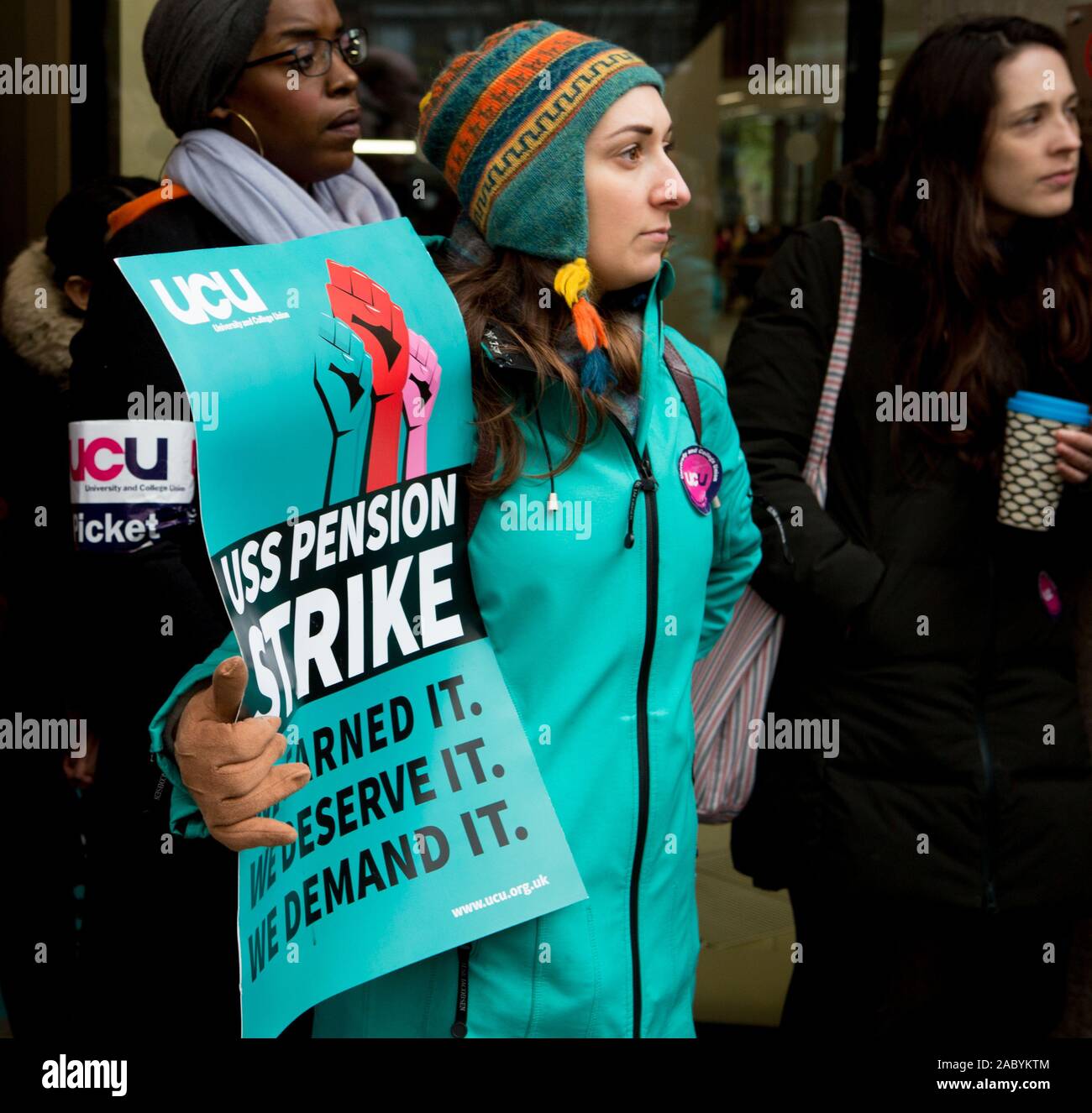 University Lecturer with a banner USS pensions strike. November 2019 ...