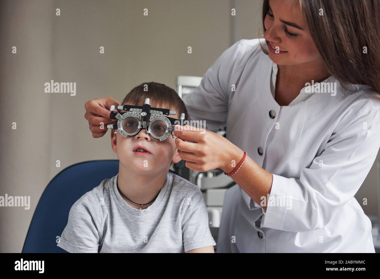 Working in process. Child sitting in the doctor's cabinet and have ...