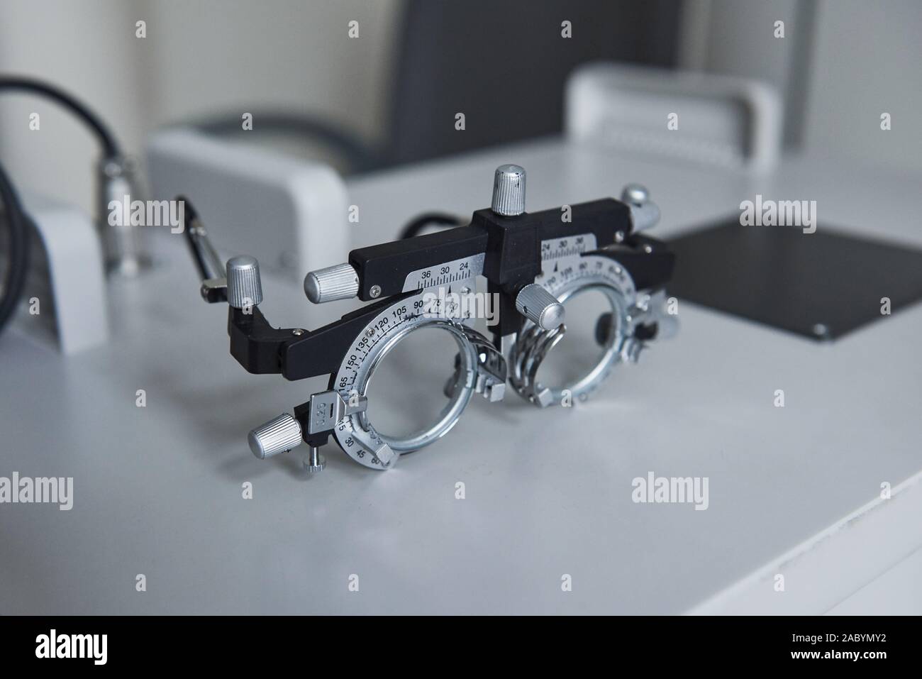 Ophthalmic glasses laying on the white table in the clinic Stock Photo ...