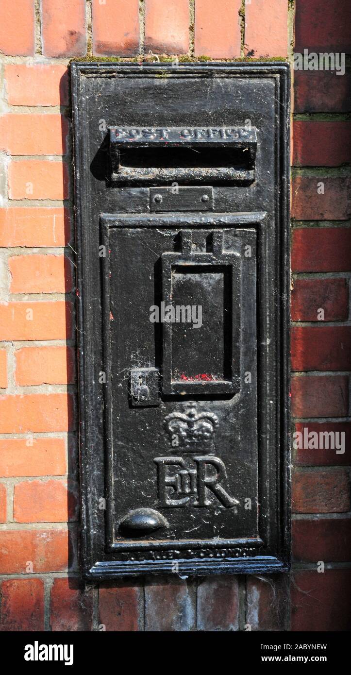 Black post box on a wall in Whitby, North Yorkshire Stock Photo - Alamy