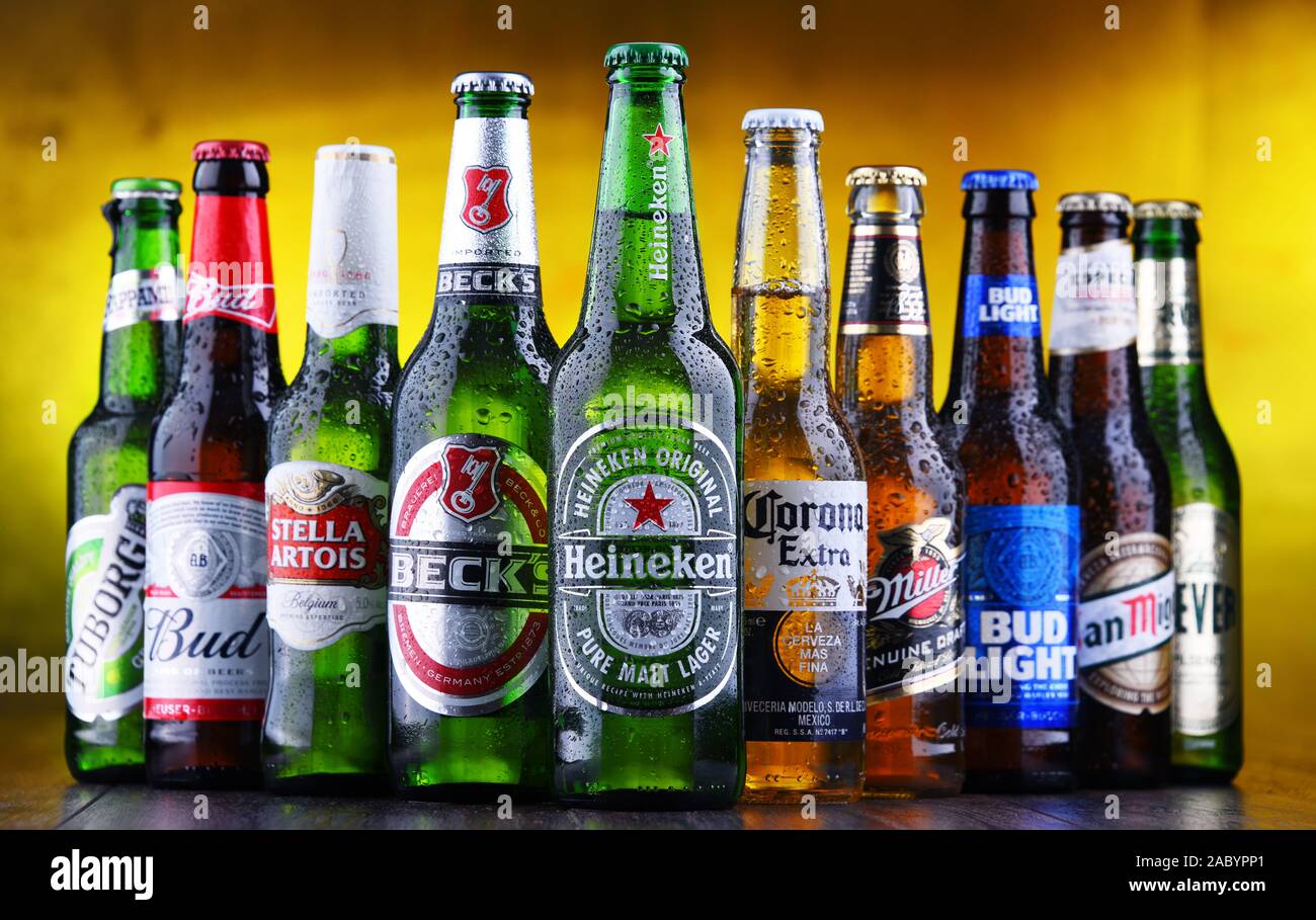 POZNAN, POL - MAR 15, 2019: Bottles of famous global beer brands ...