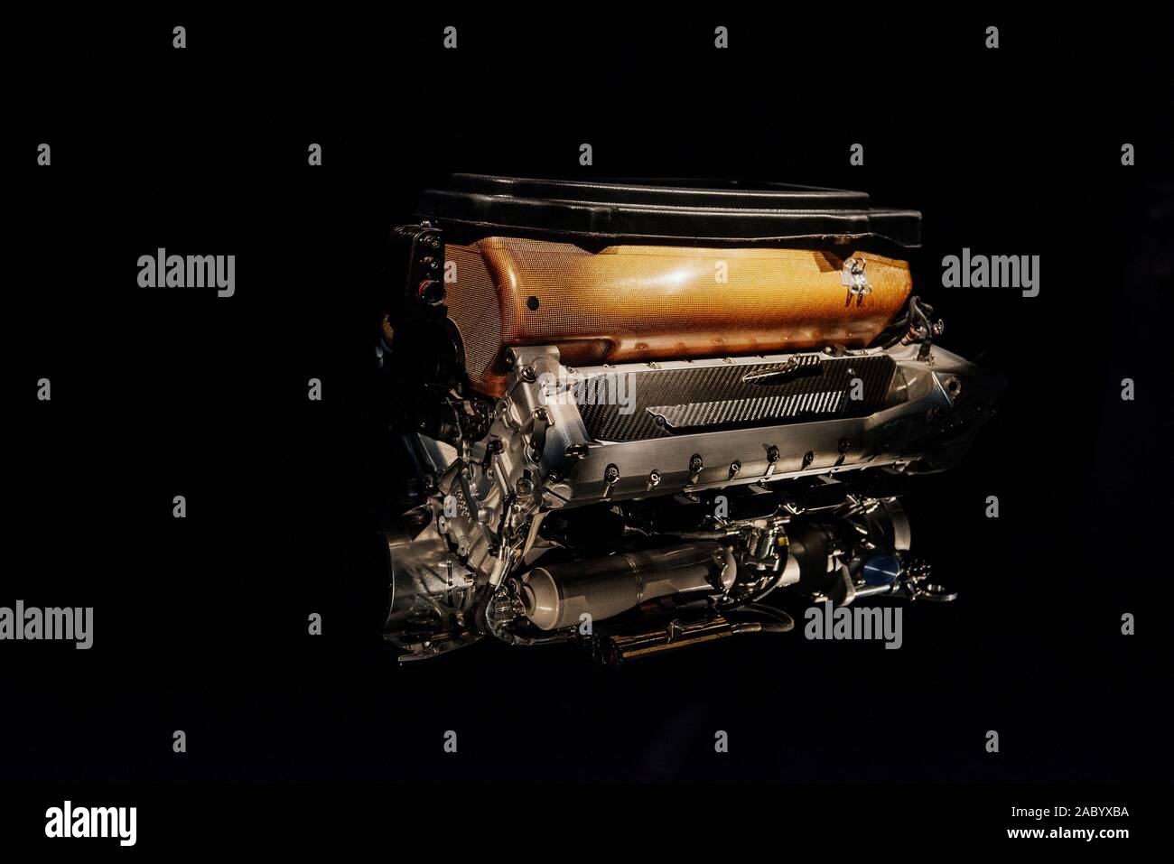 Side and front view of car detail: internal combustion engine with ...
