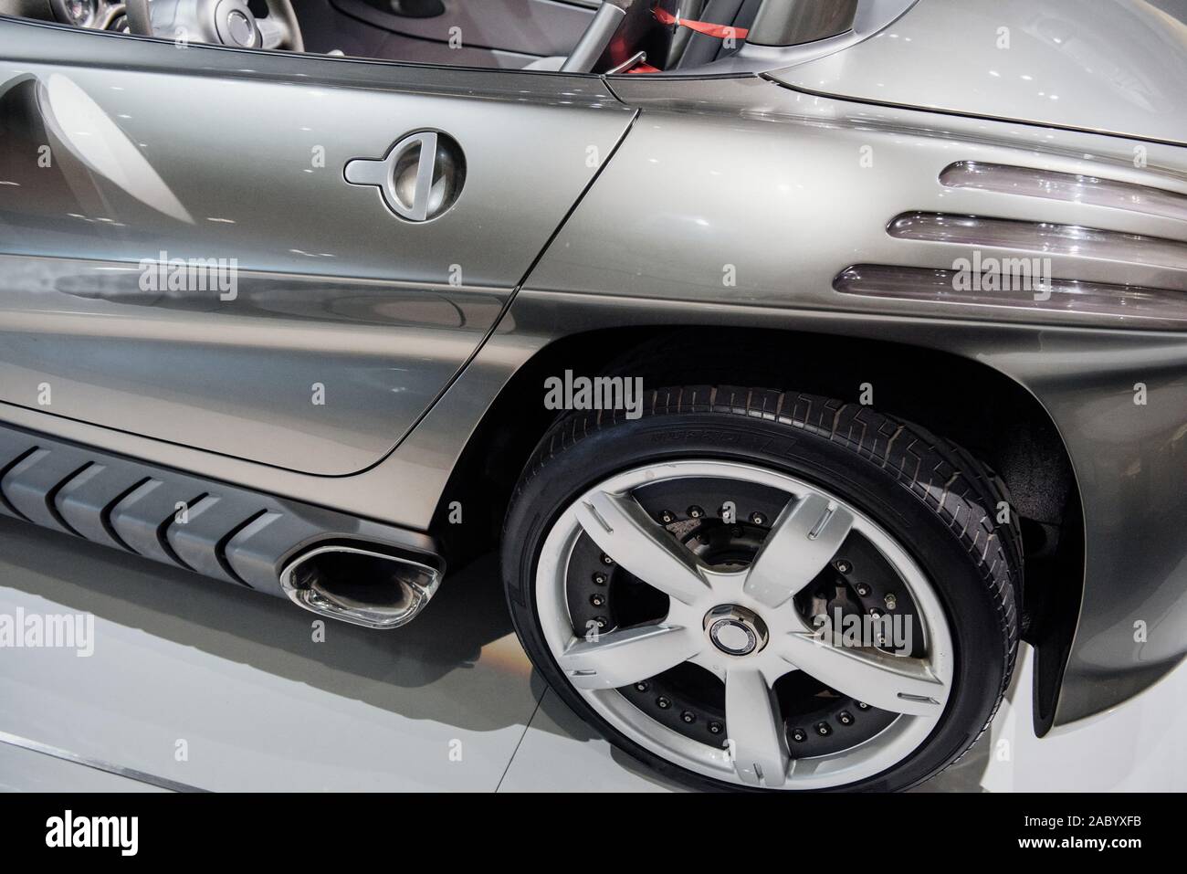 Side close up view of modern roofless grey sport coupe car with chrome ...