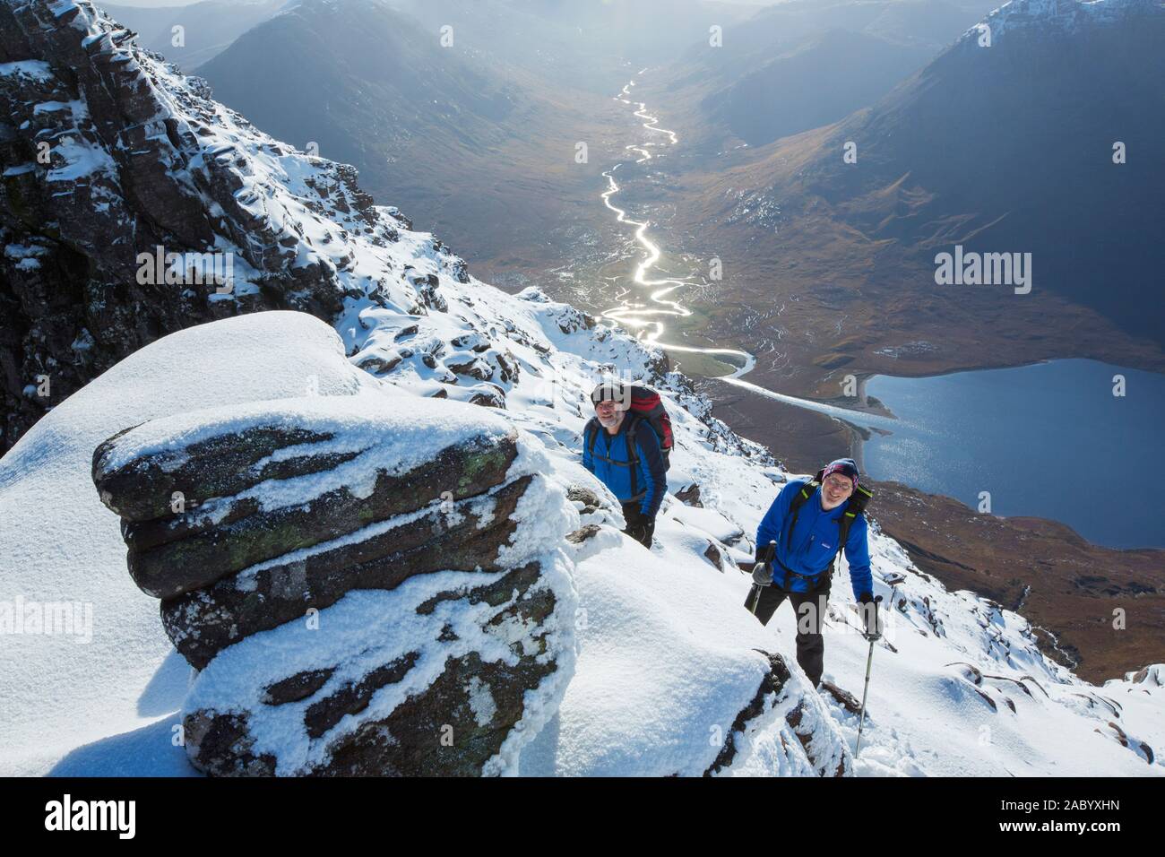 Mountaineers below Lord Berkeley's Seat on the Munro An Teallach, one ...