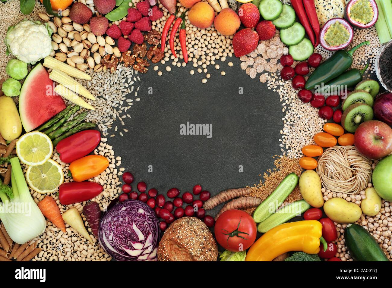 Vegan health food border with a large collection of foods. High in ...