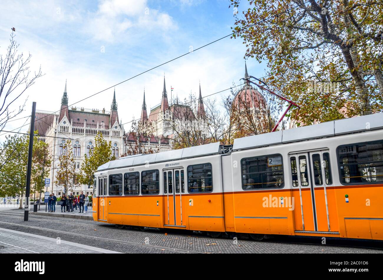 Budapest, Hungary - Nov 6, 2019: Public yellow tram riding in front of ...