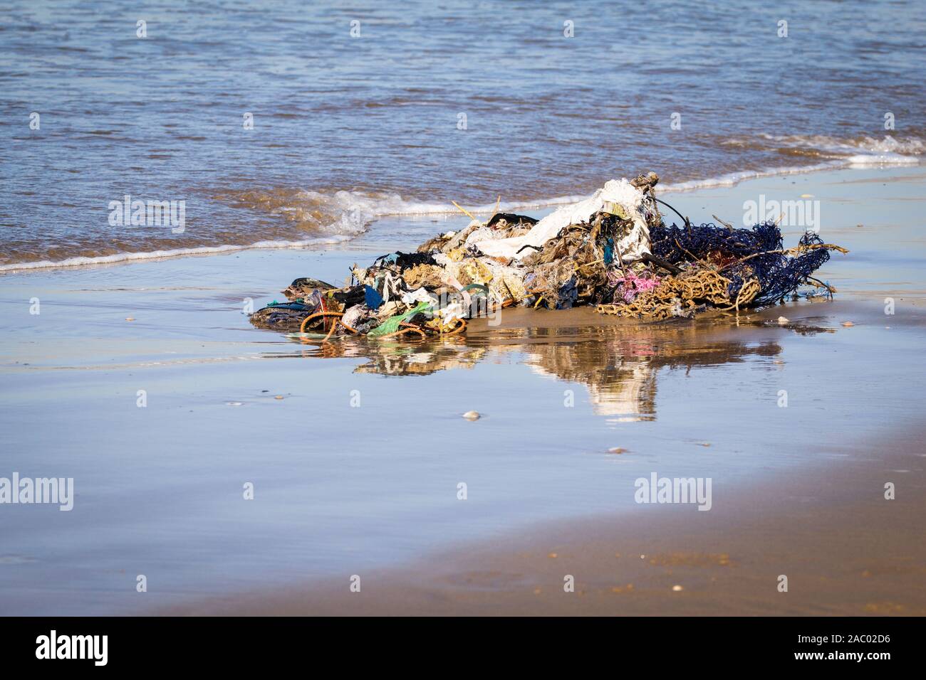 Clothes, plastic and household waste rubbish washed up from the ...