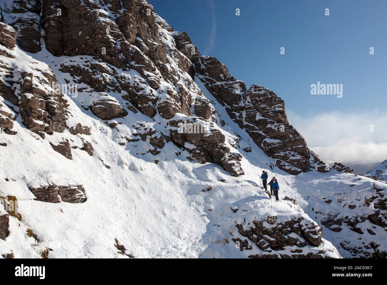 Mountaineers on the Munro An Teallach, one of Scotlands finest mountain ...