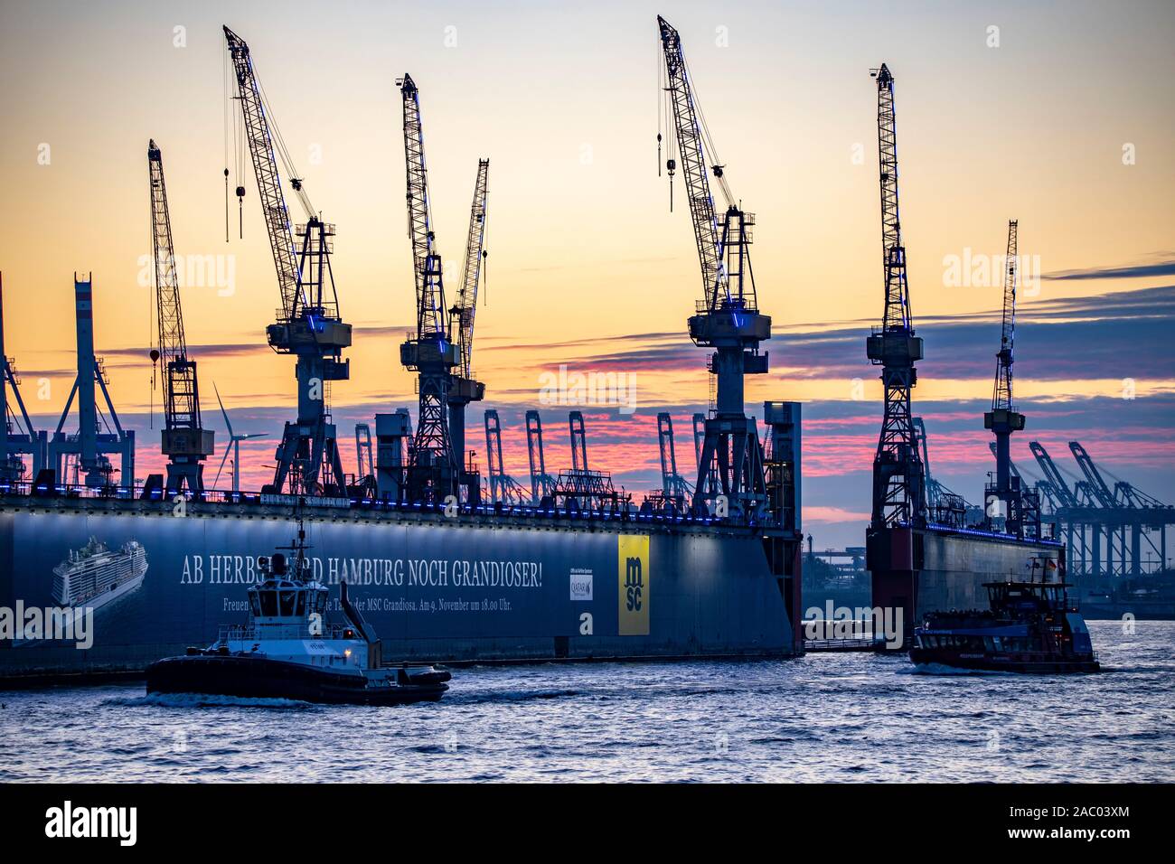 Container ships dock at burchardkai in the port of hamburg hi-res stock ...