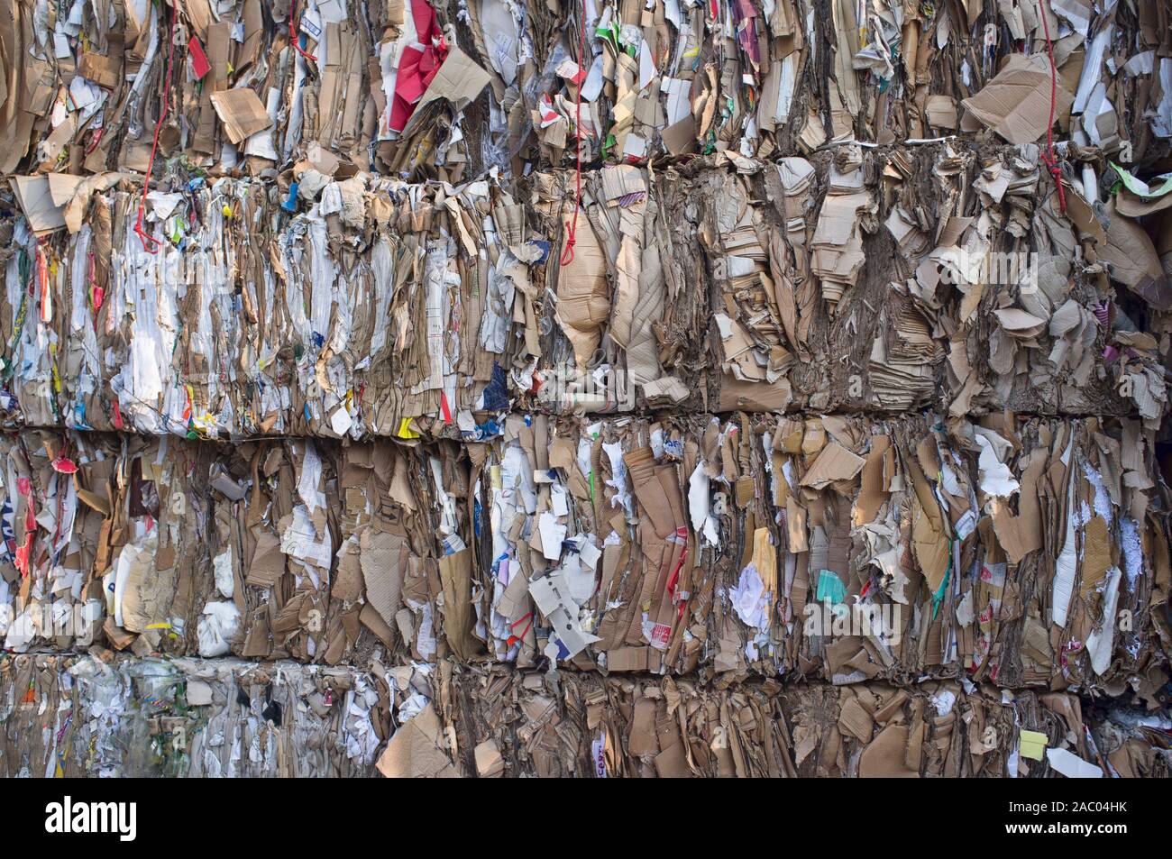 compressed paper and cardboard waiting recycling Stock Photo - Alamy